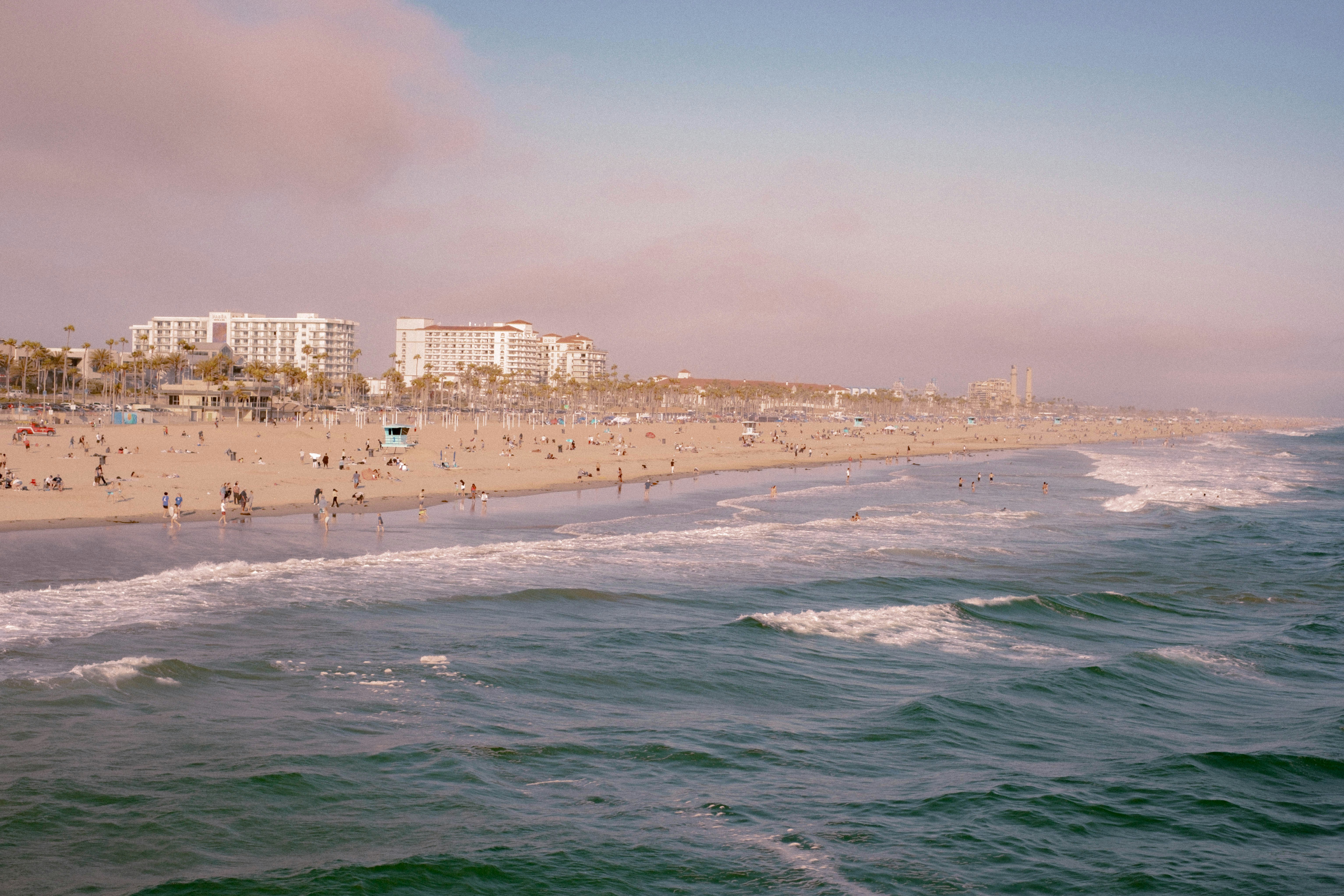sunlit promenade and surf at a sun-kissed beach