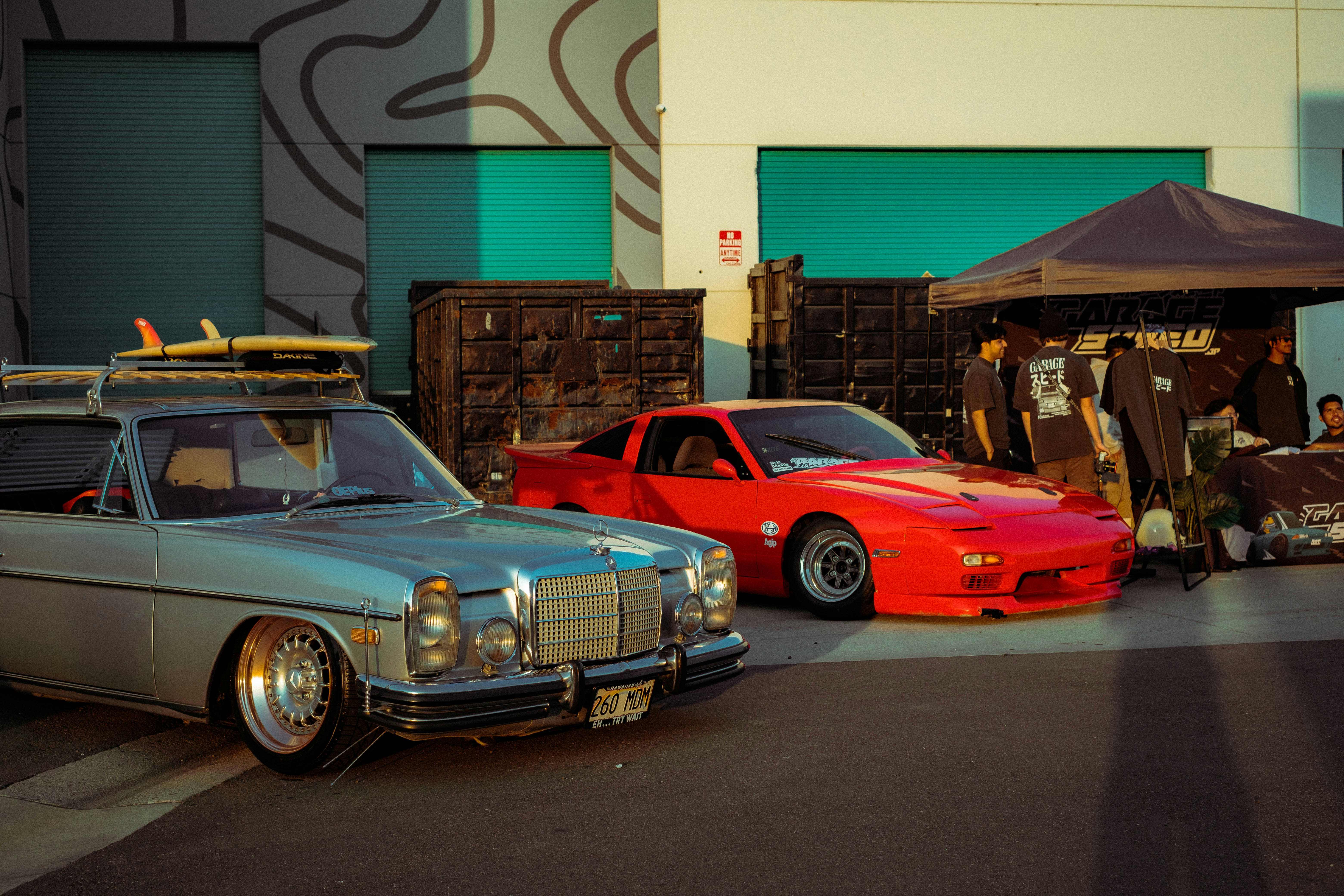 Crimson Velocity Between Chrome and Teal: A Car-Show Moment