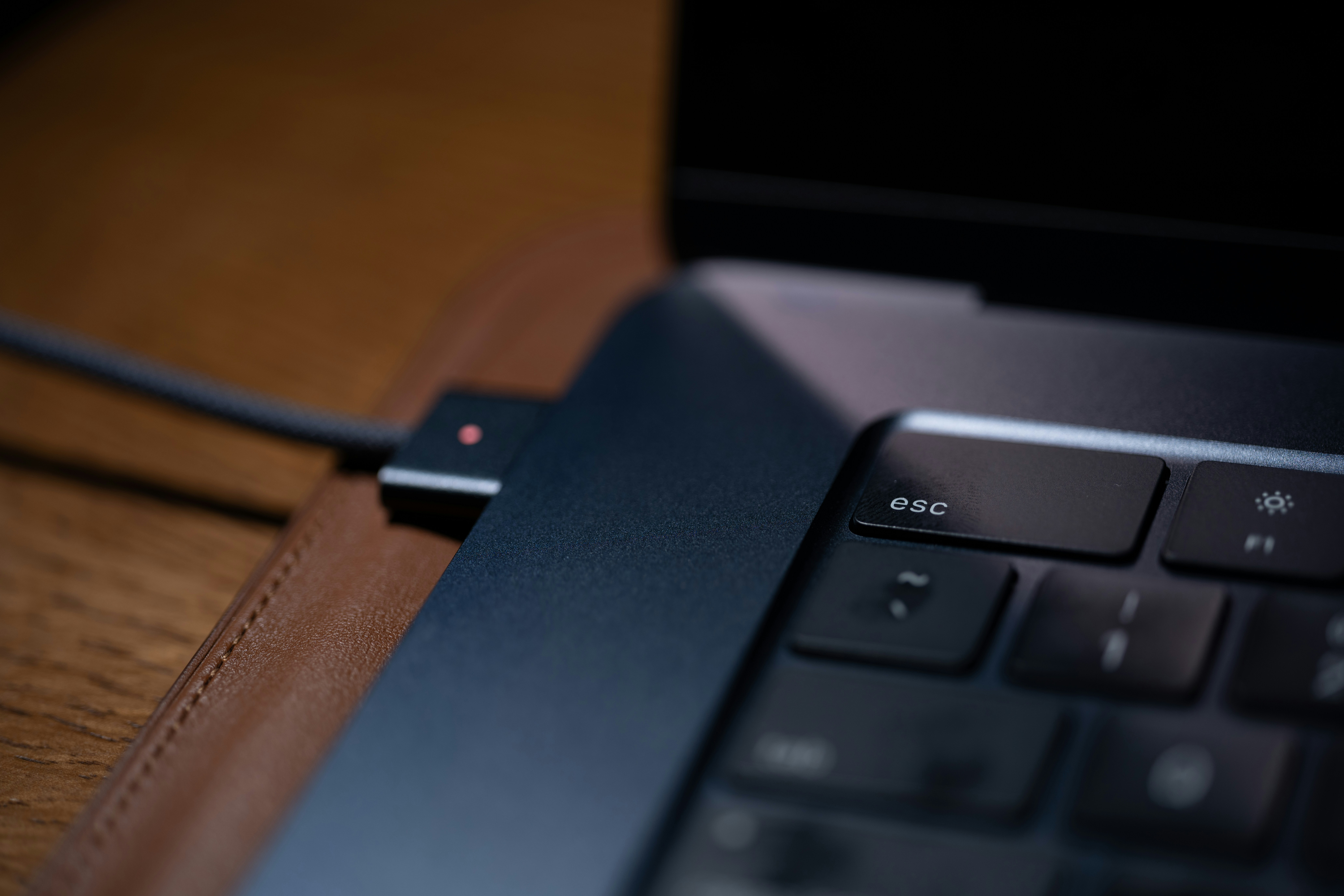 A close up of a laptop on a wooden table photo – Free Computer Image on ...
