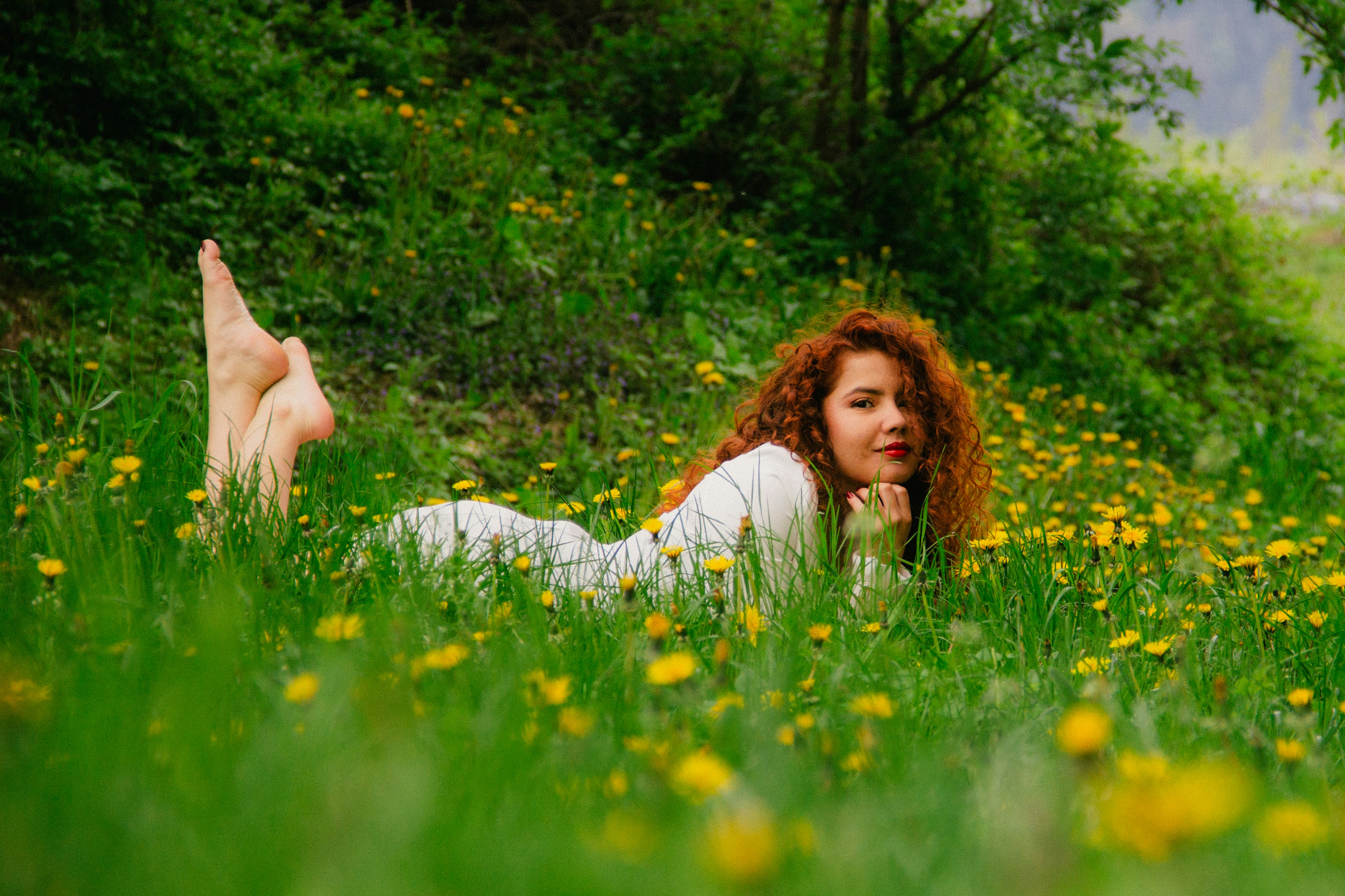 Girl Laying In Field
