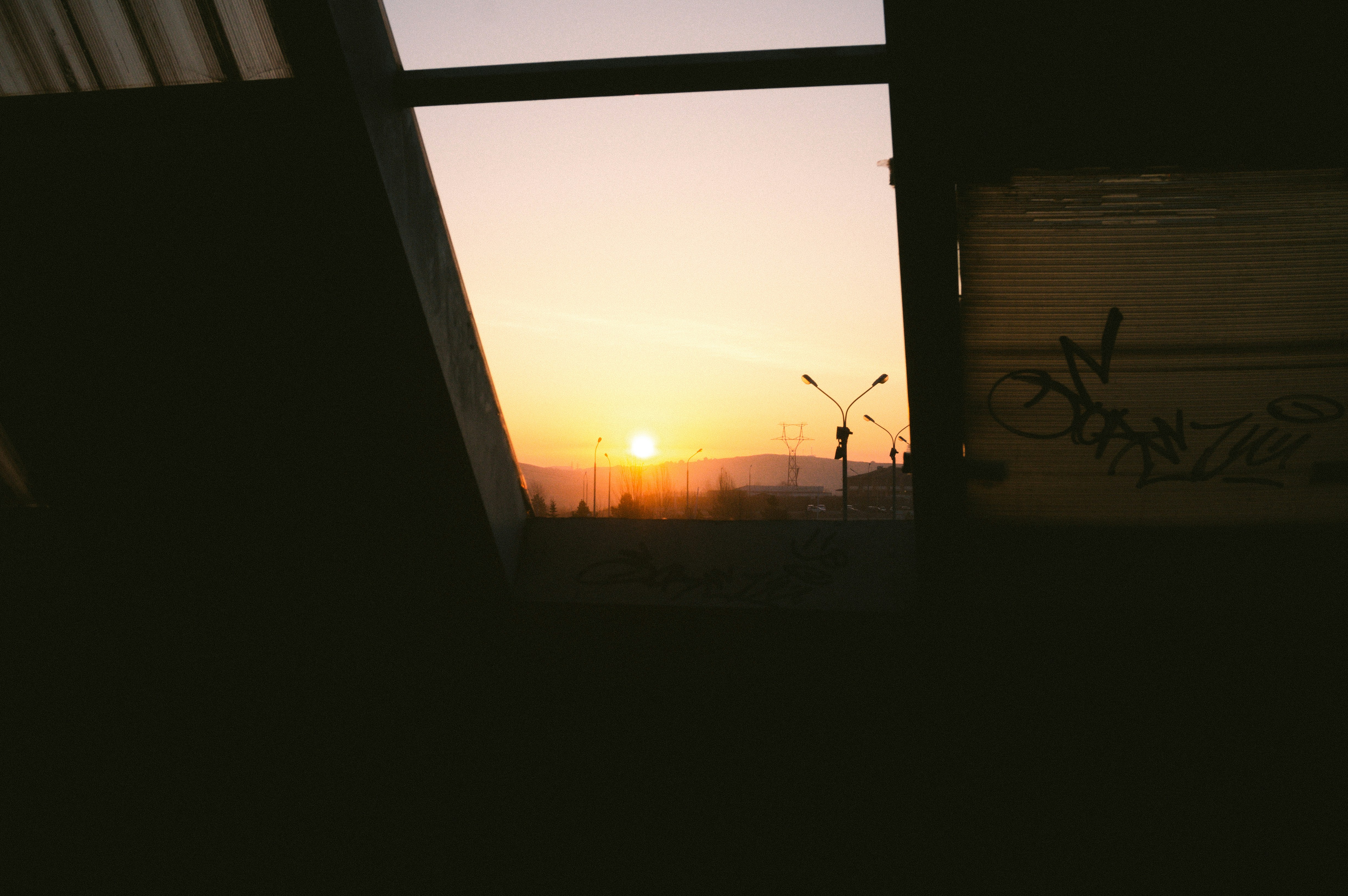 A view of a sunset through a window photo – Free Sunset Image on Unsplash