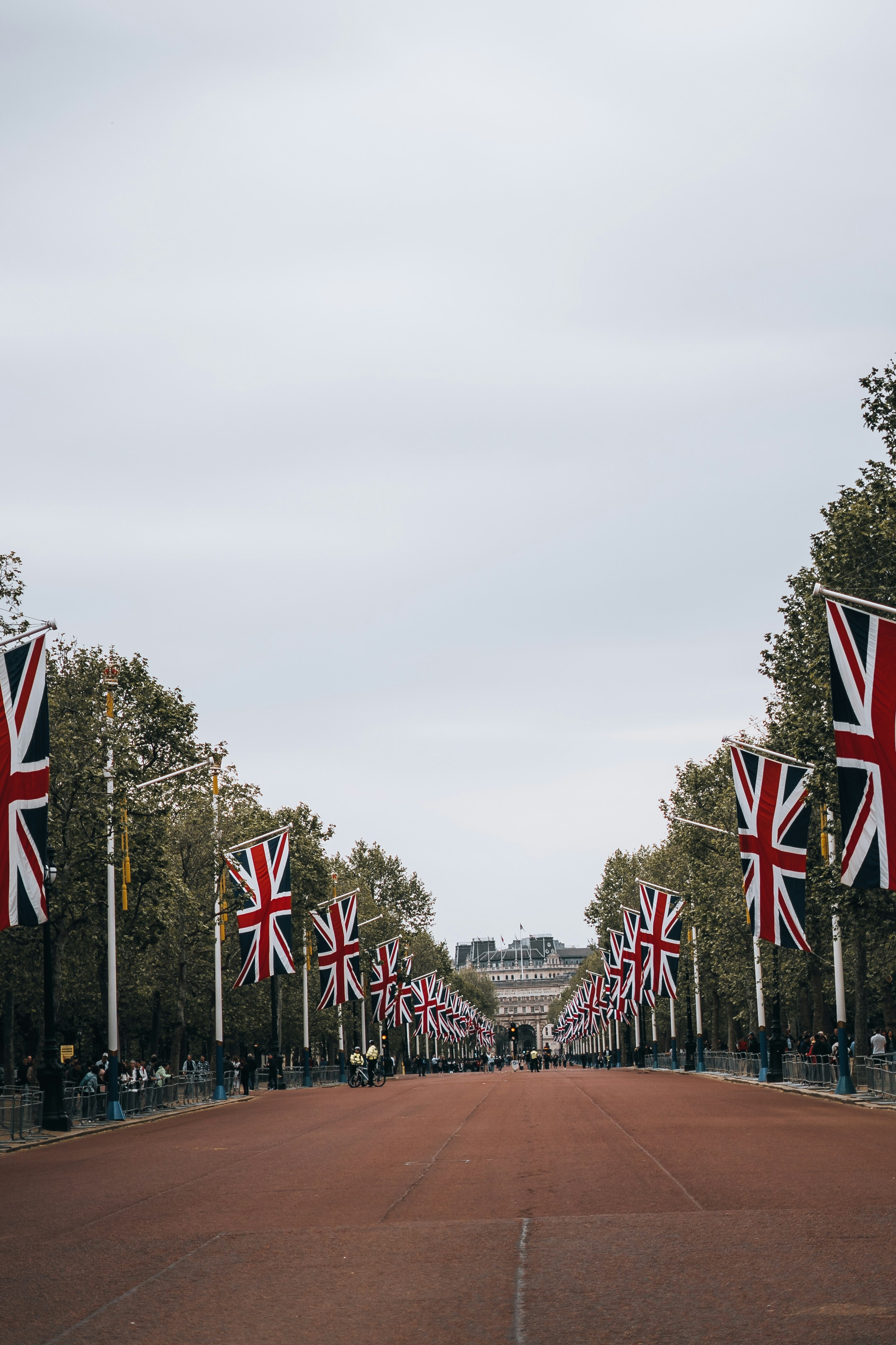 A street lined with lots of british flags photo – Free Buckingham ...
