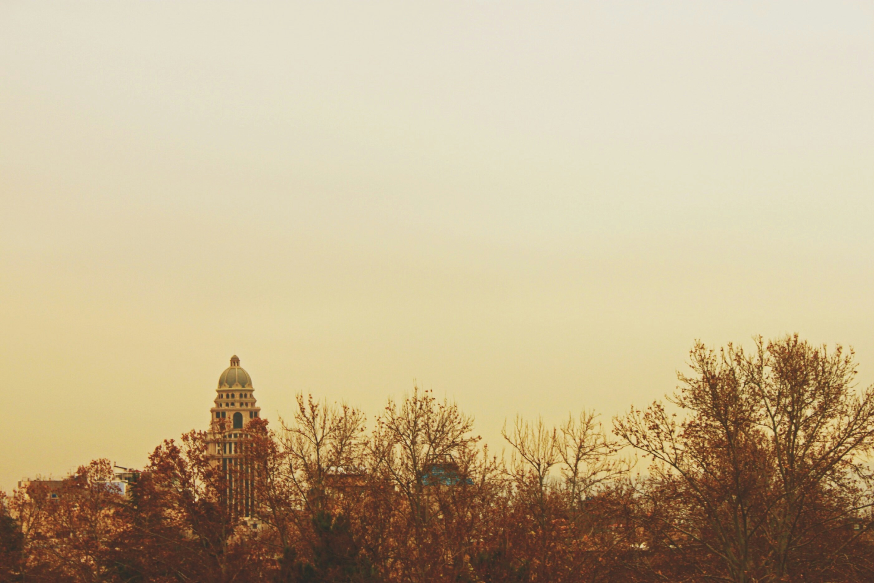 A large clock tower towering over a city photo – Free Tehran Image on ...