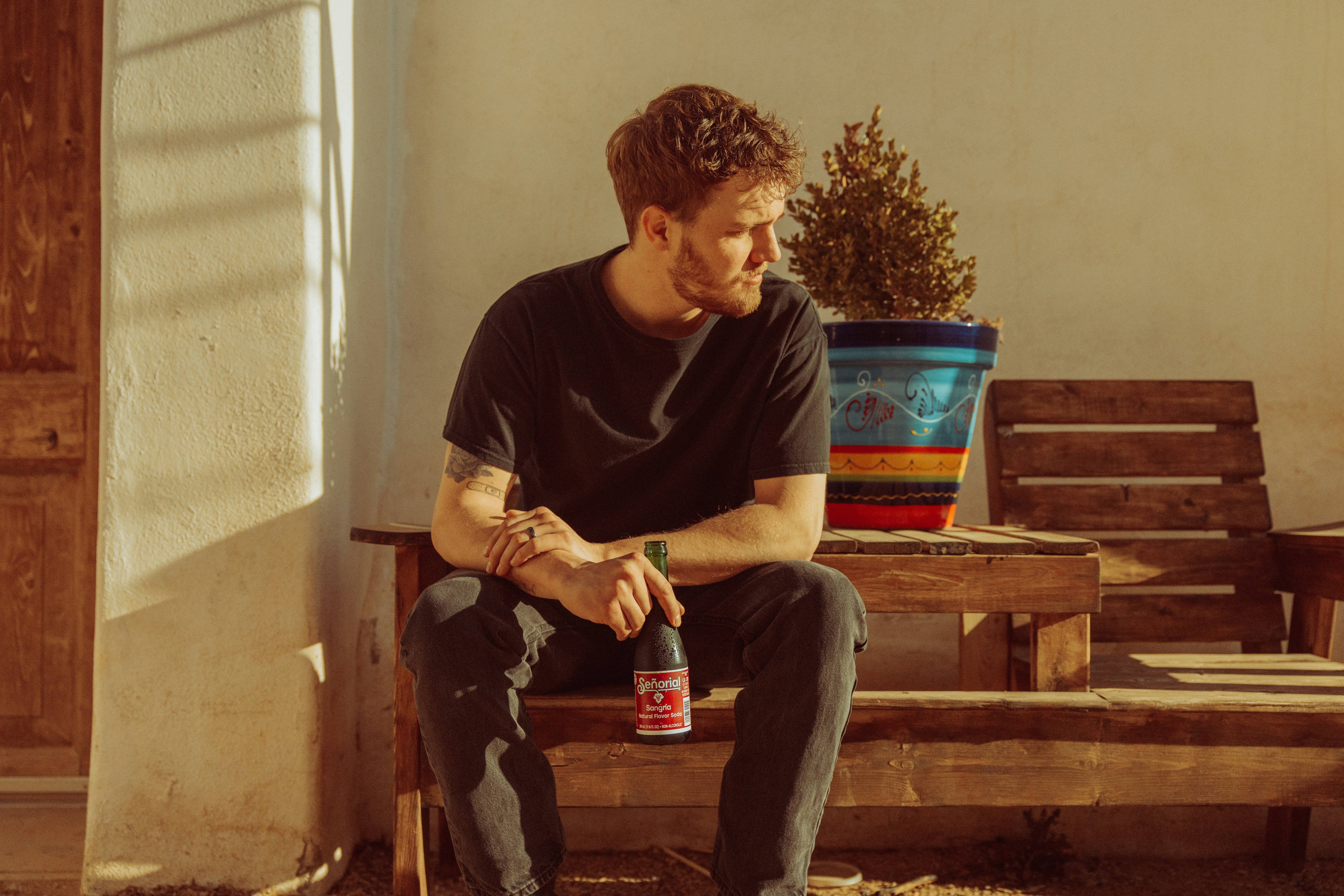 Amber Hour on a Wooden Bench: A Quiet Portrait in Warm Light