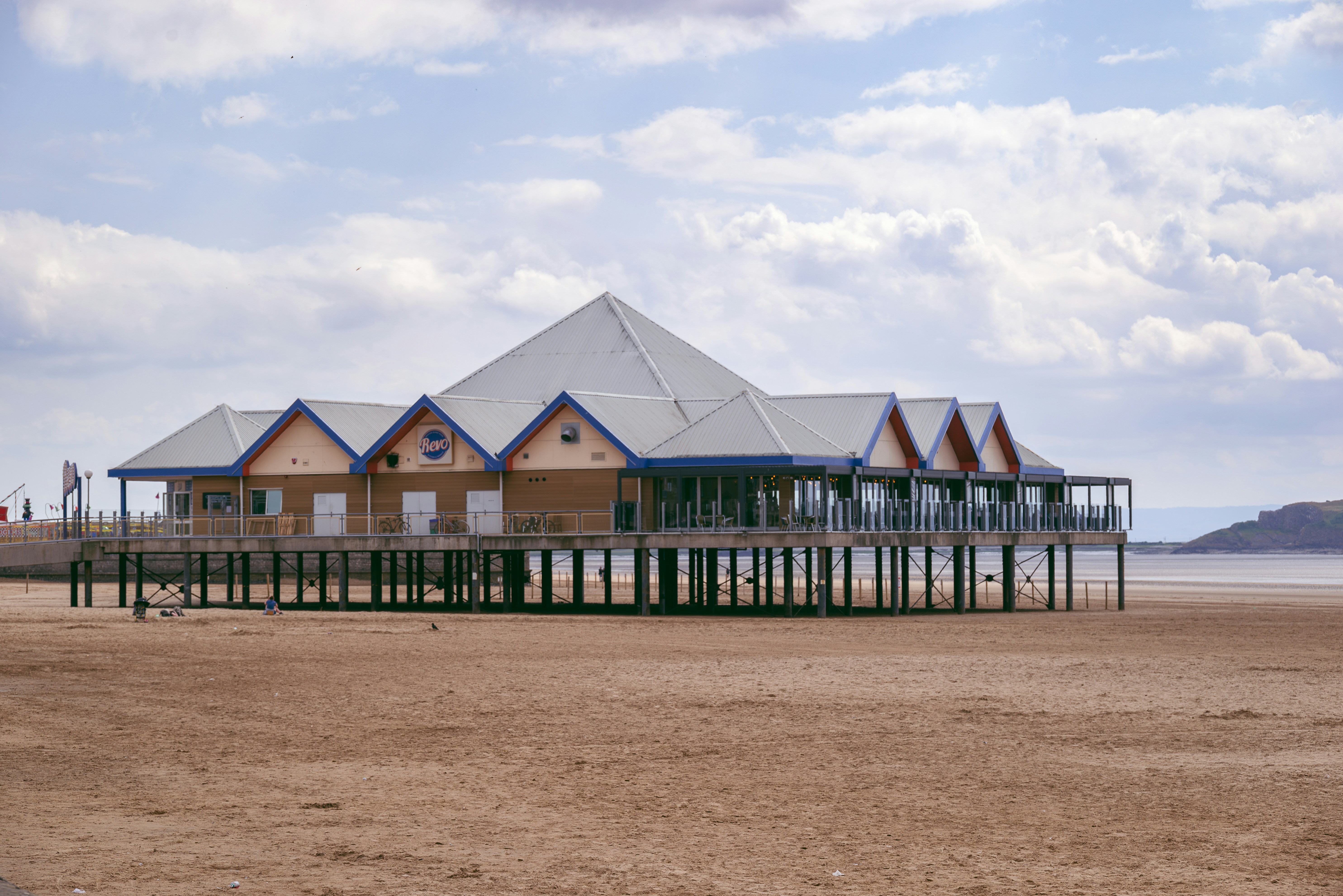 Pierfront Pavilion Reaches Over Calm Tides