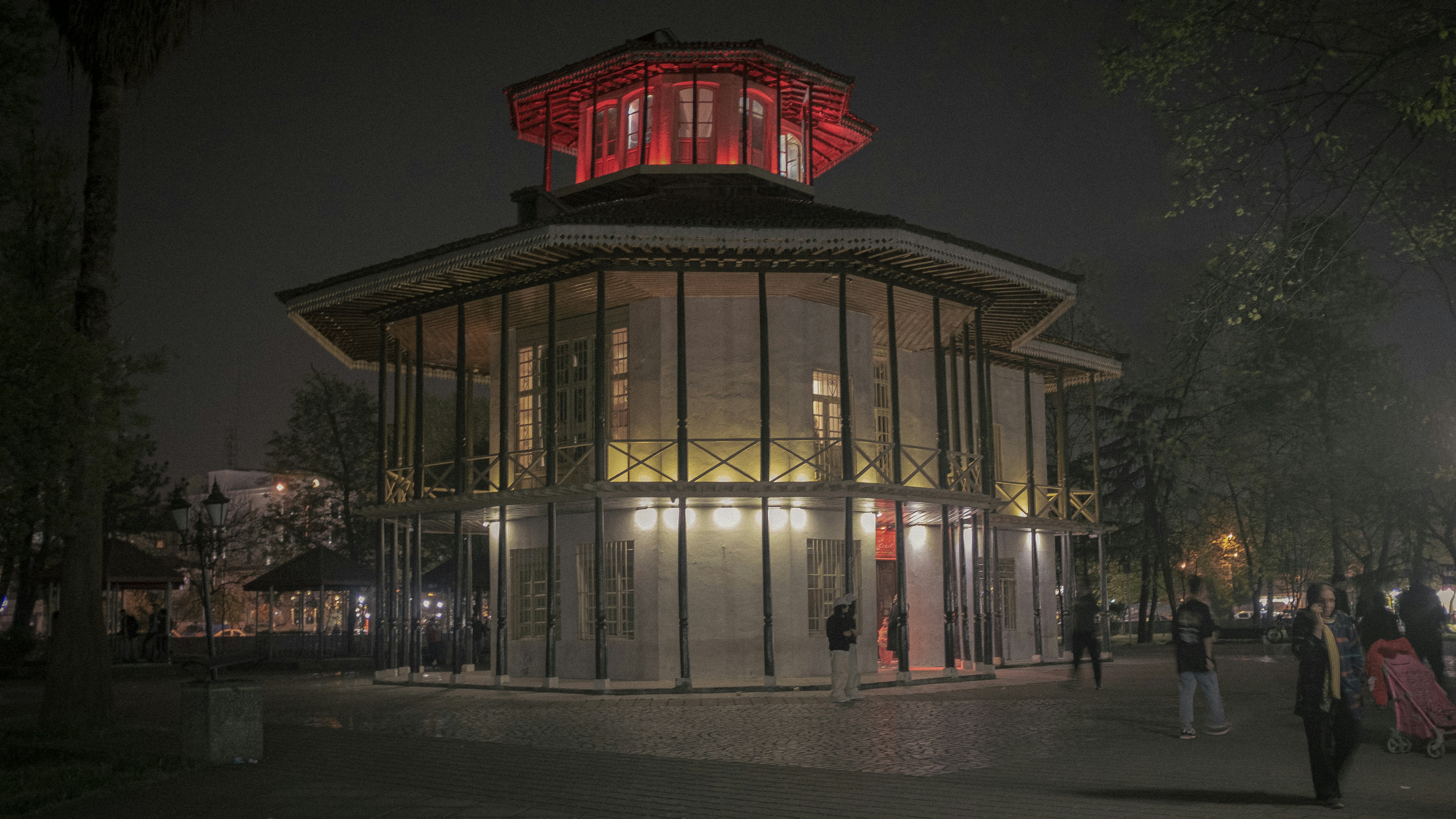 (People in this photo have the consent to be in it) | a building with a red light on top of it