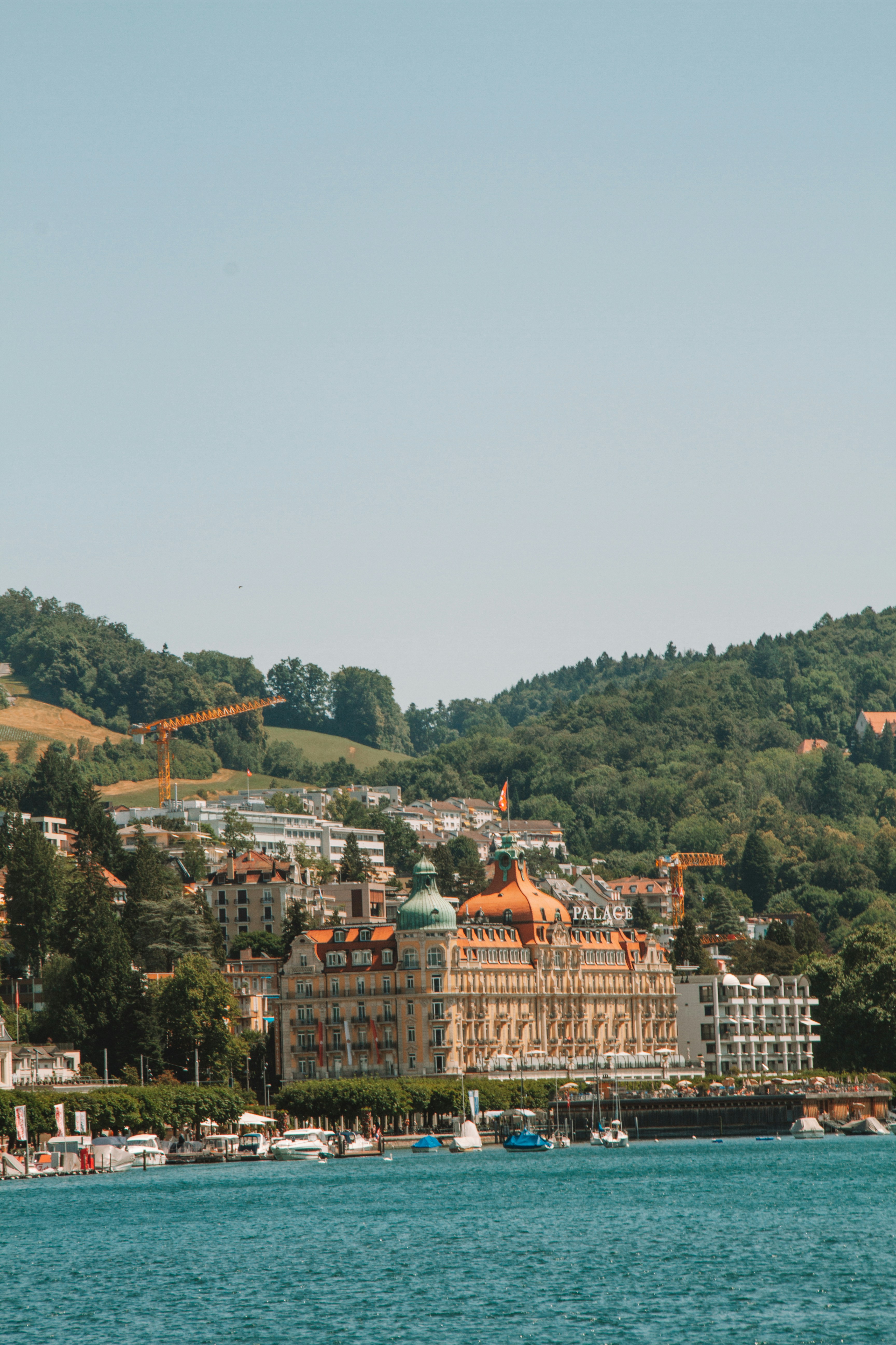 Lakeside Palace with Orange Dome Framing a Turquoise Waterfront