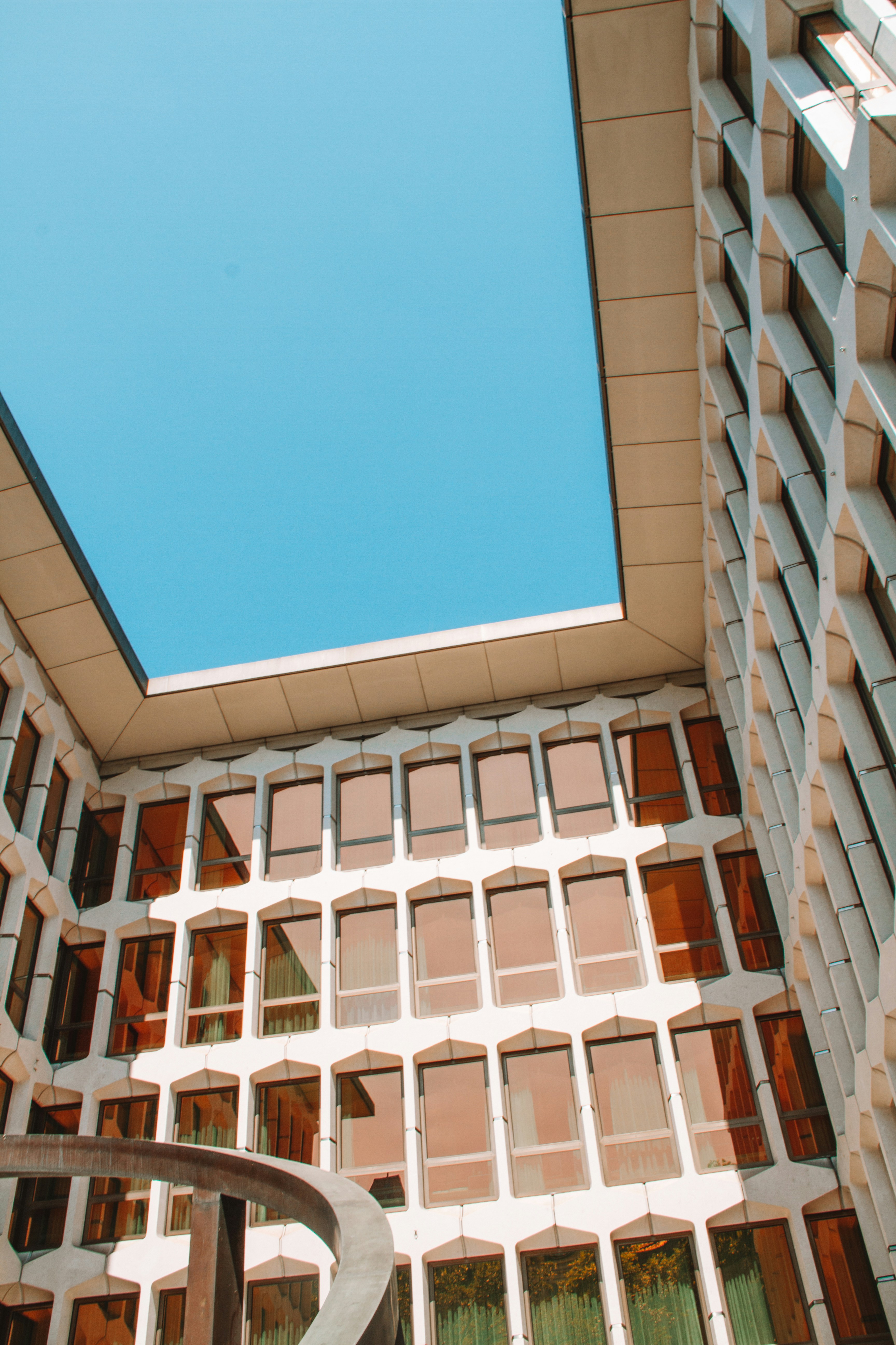 A building with a skylight in the middle of it photo – Free Housing ...