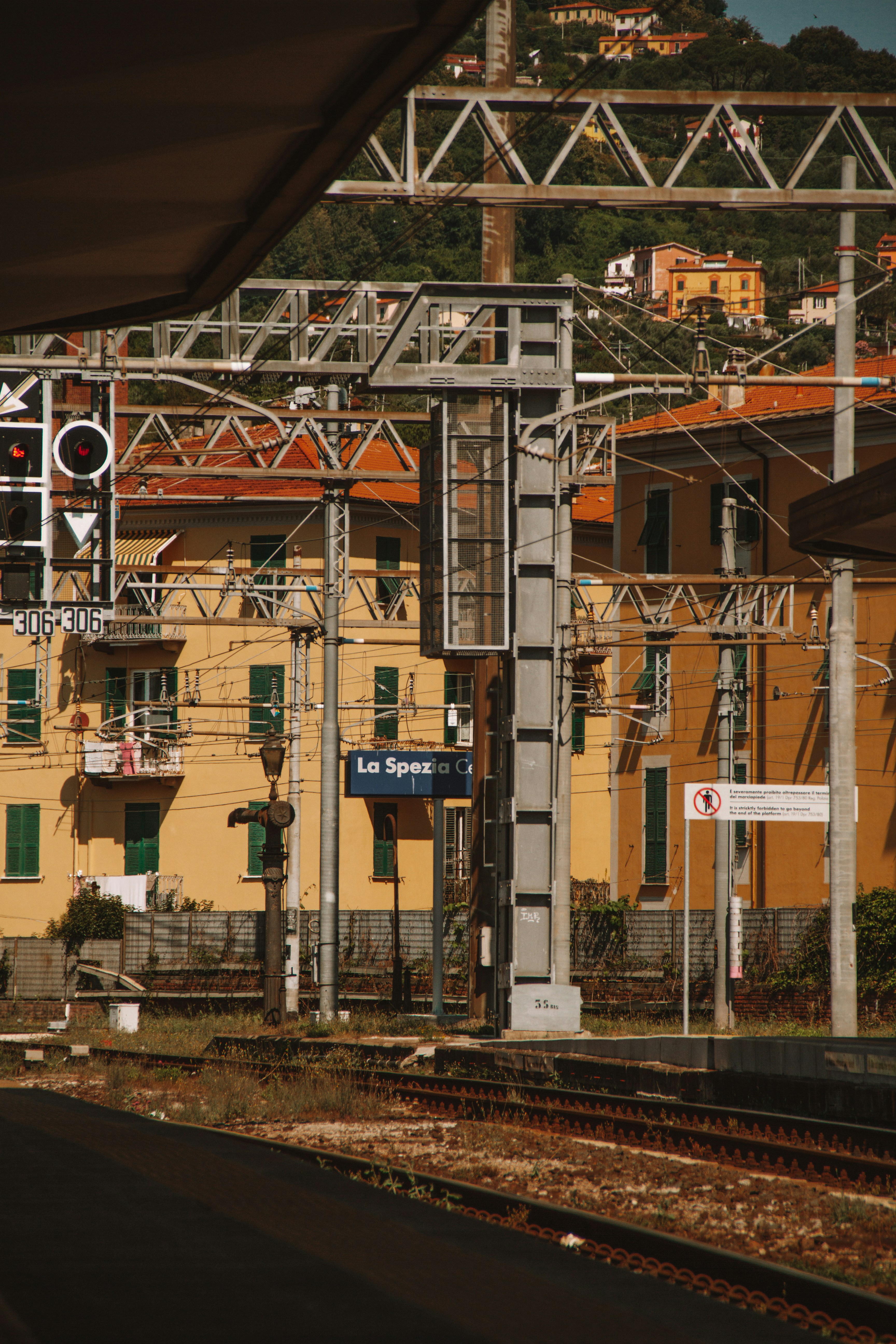Crisscrossed Ironwork Framing La Spezia Station at Golden Hour