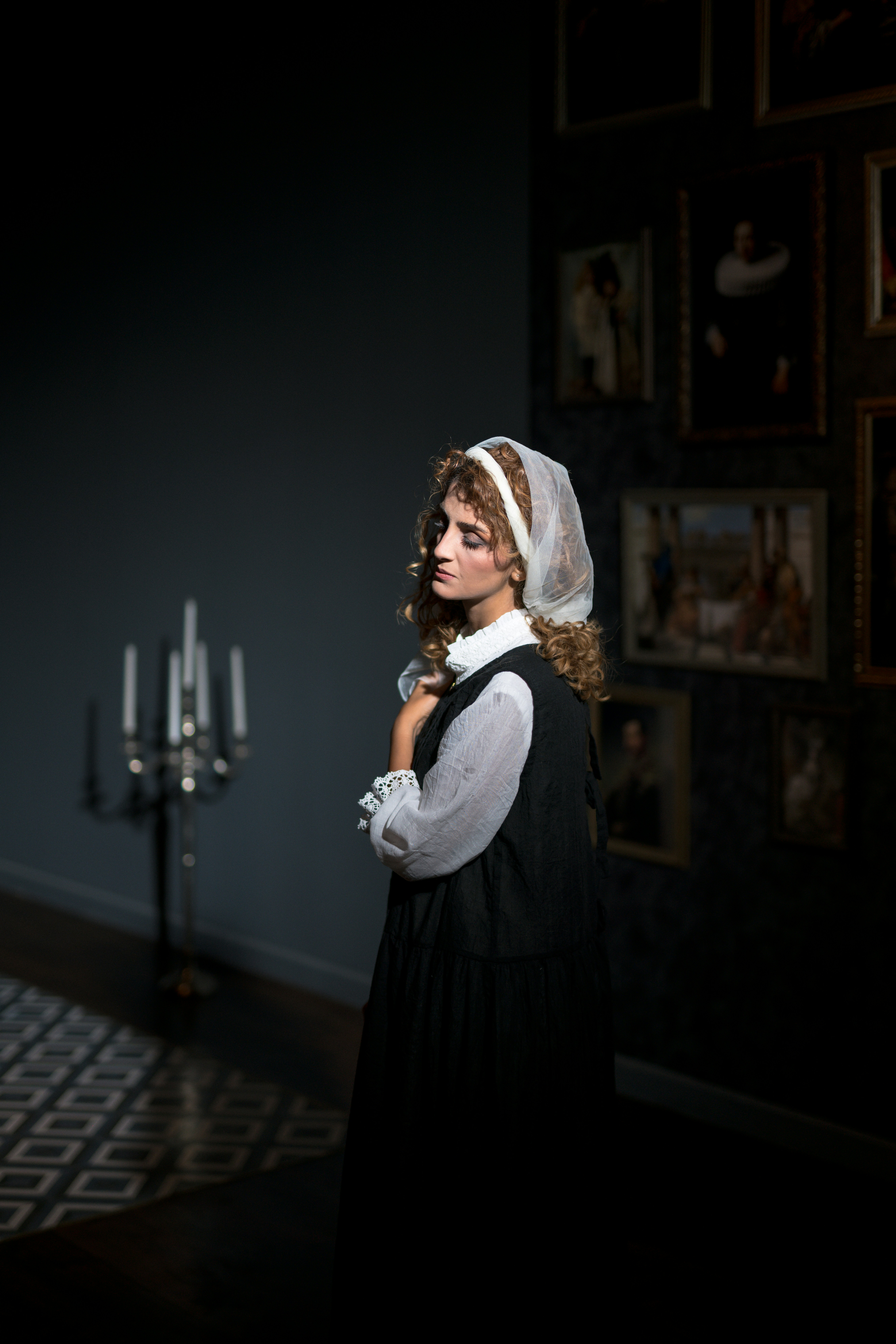 Veiled Reverie in a Portrait Gallery