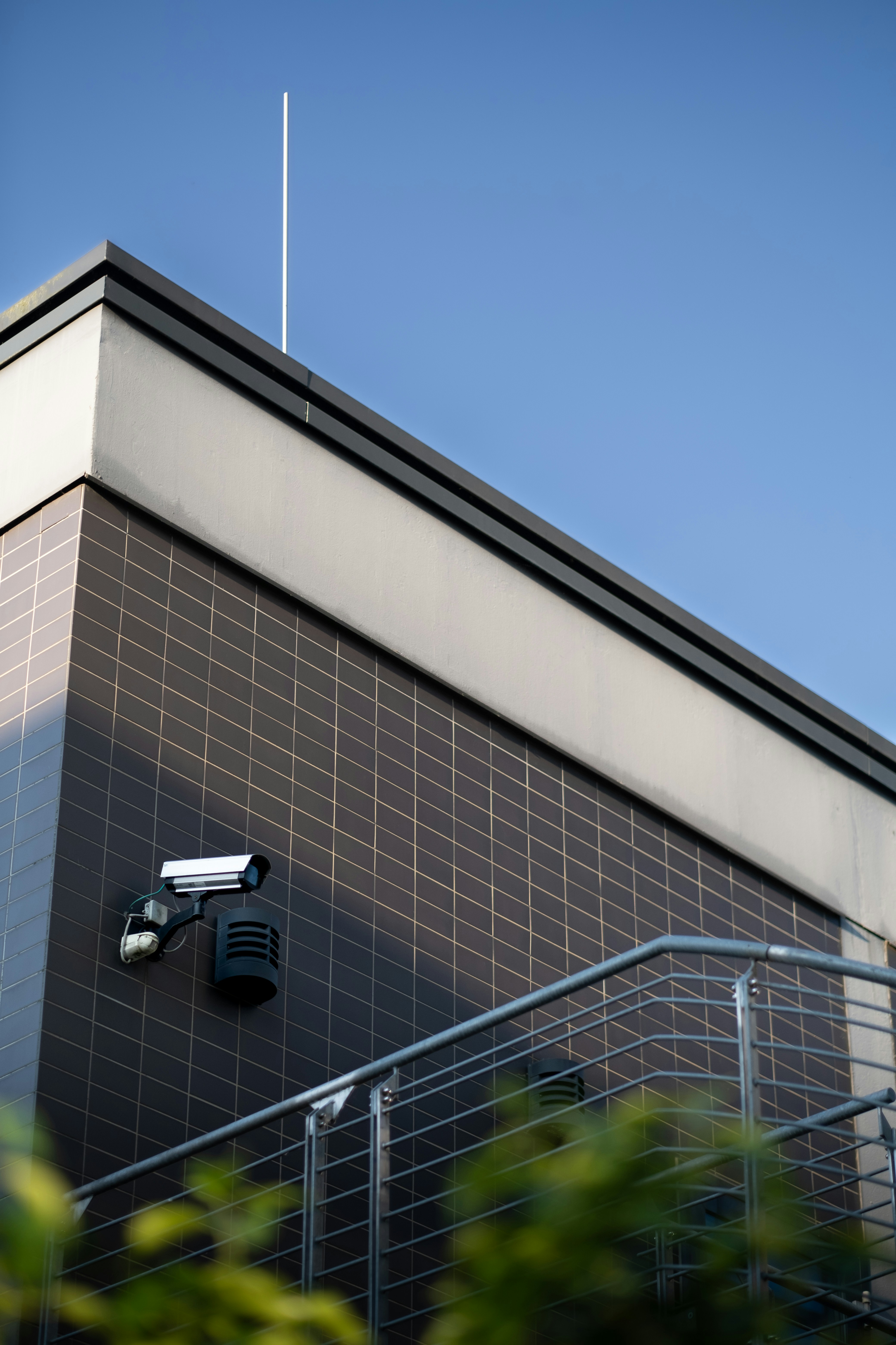 A security camera on the side of a building photo – Free Saarbrücken ...