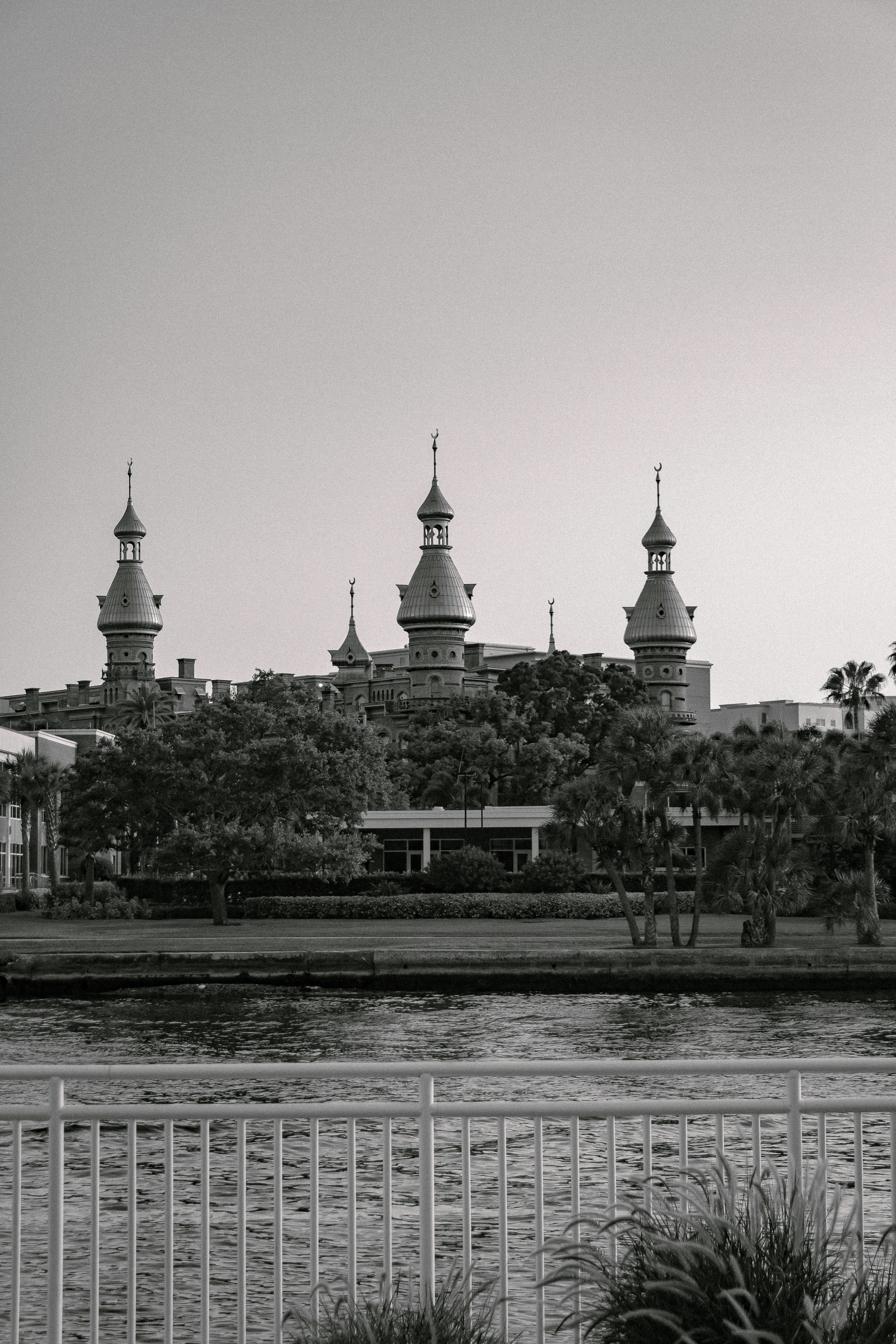 Monochrome Spires Over a Quiet Riverside
