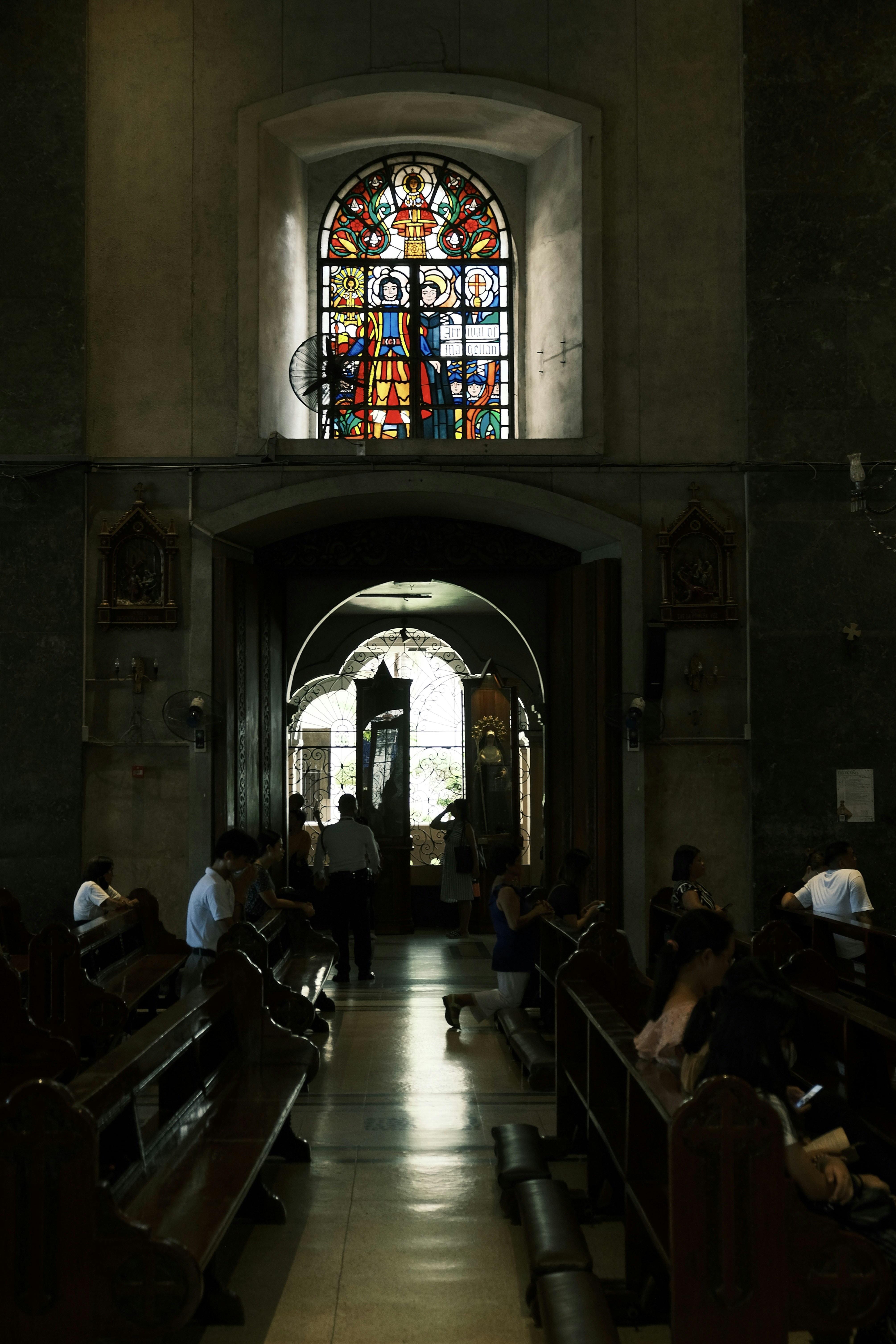 A church filled with pews and stained glass windows photo – Free Woman ...
