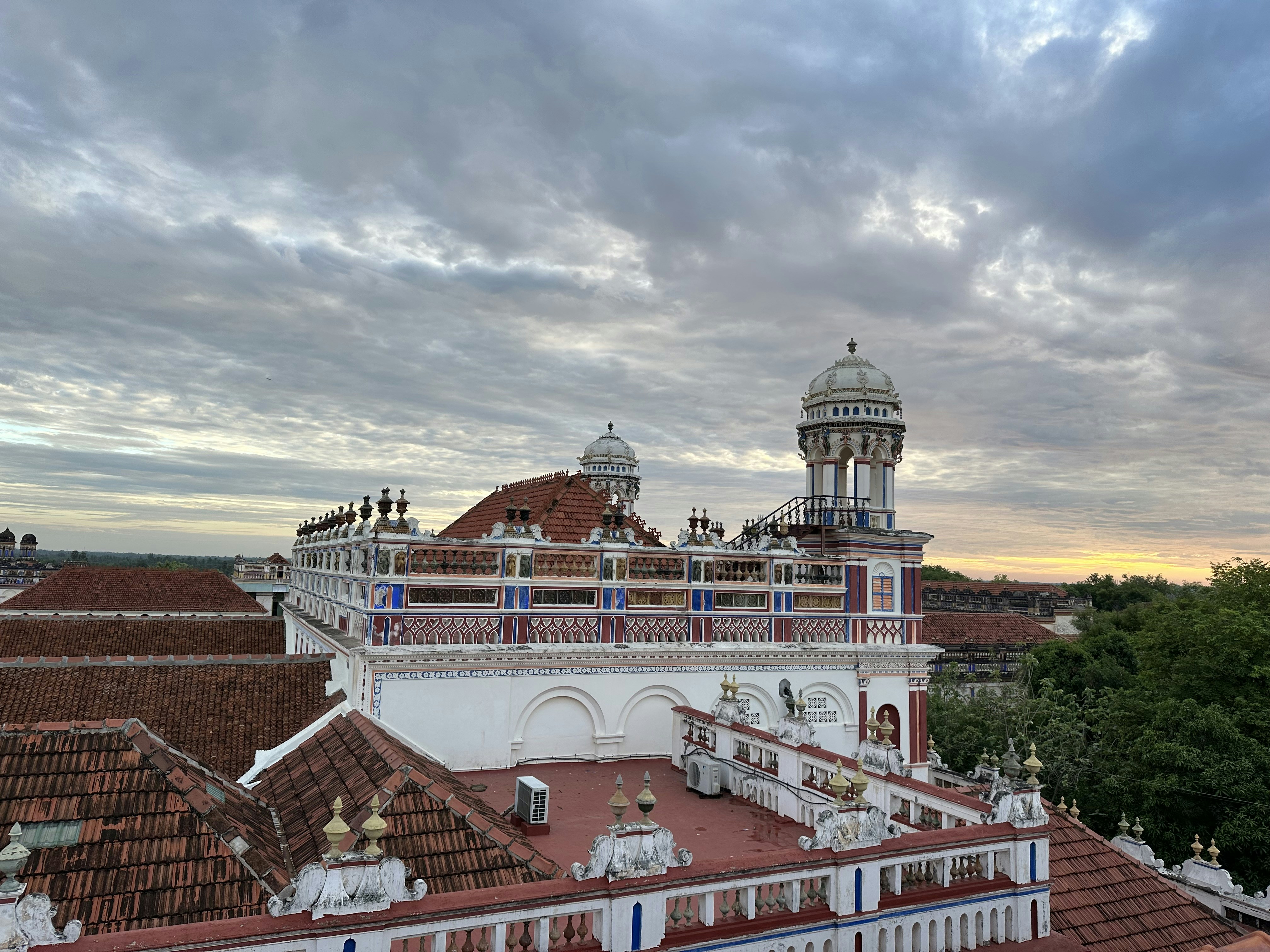 A view of a building from the top of a building photo – Free Building ...