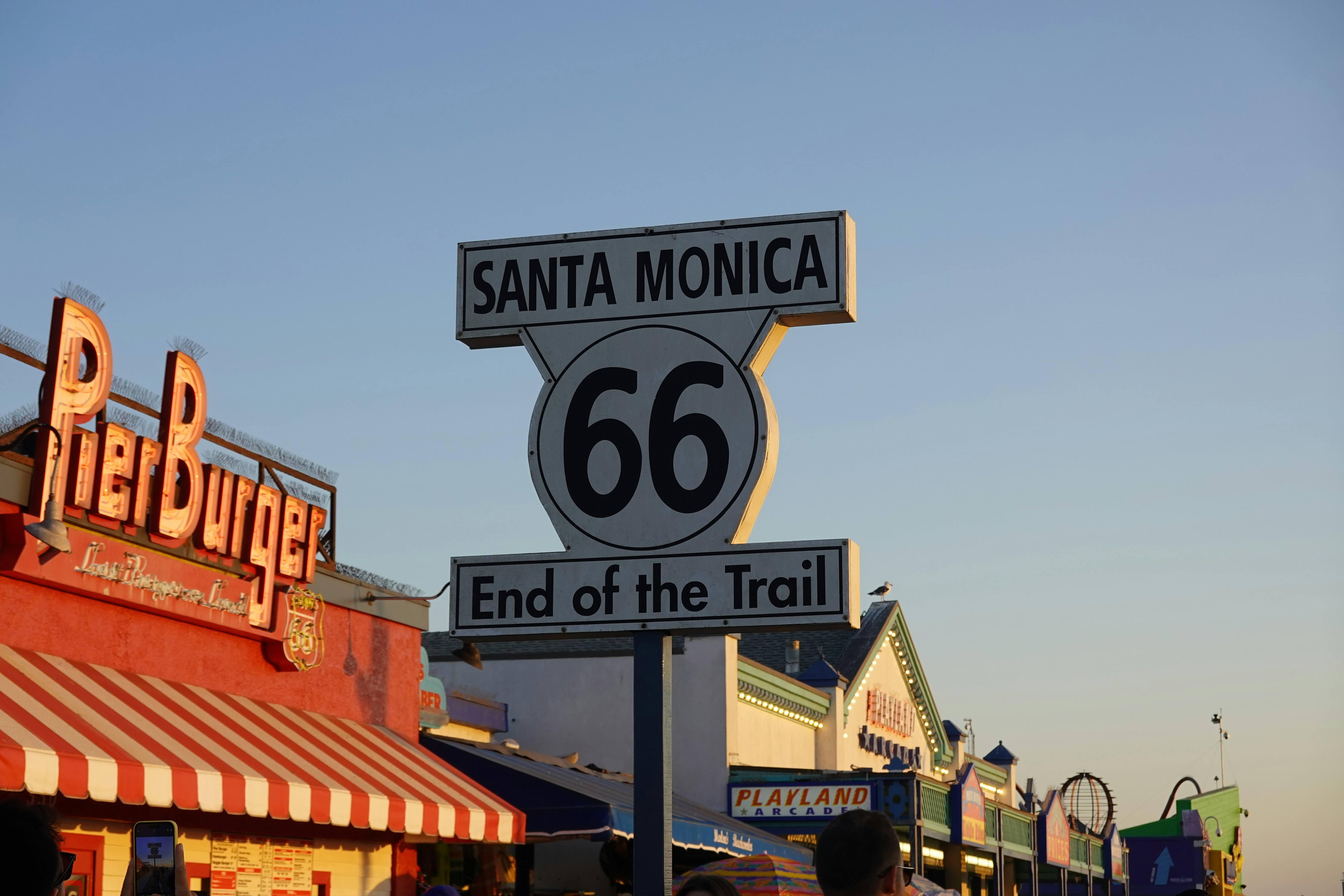 End of the Trail Sign: Route 66 at Santa Monica Pier in Golden Hour