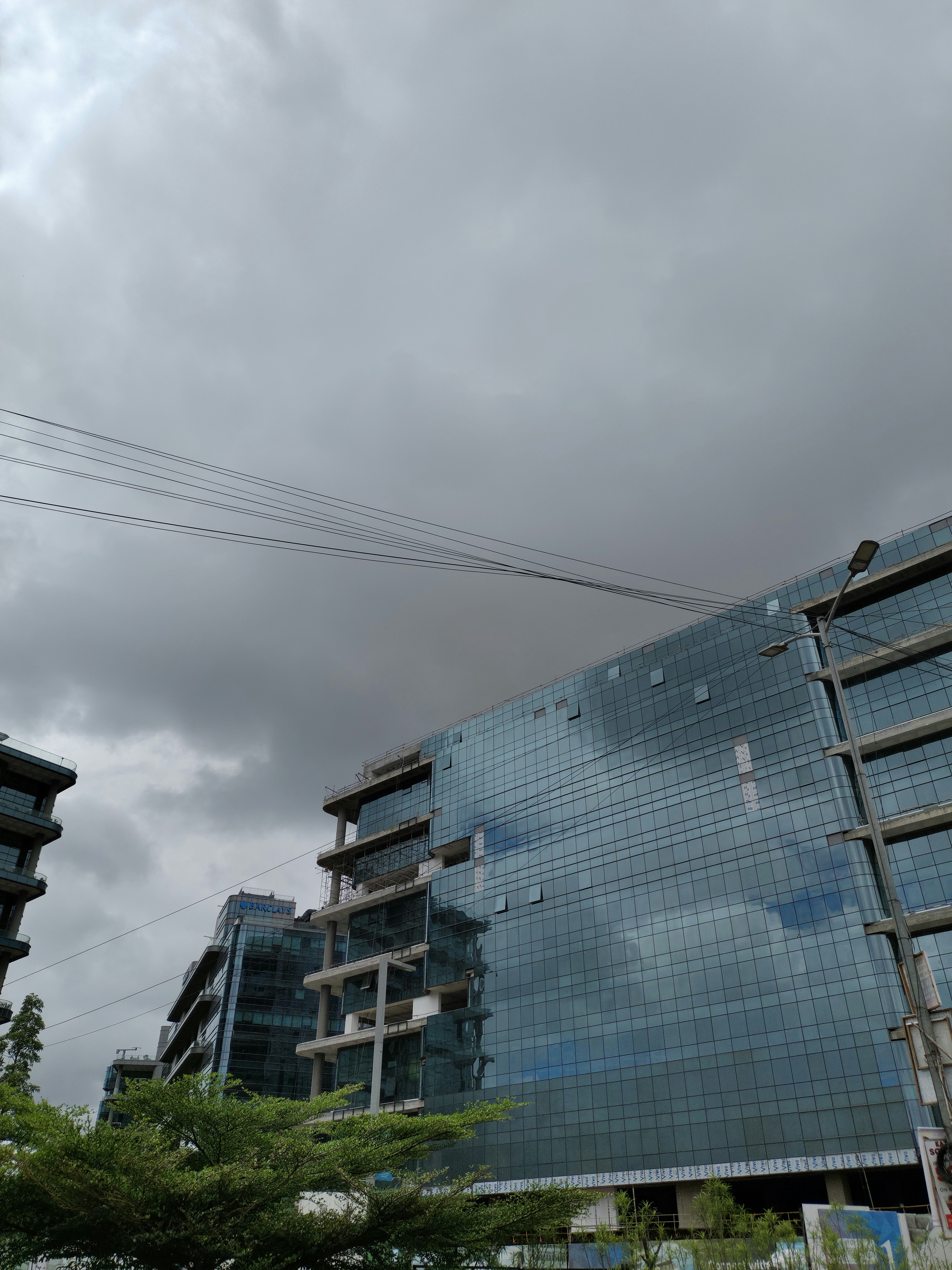 Blue Glassed Skyline Under Stressed Clouds