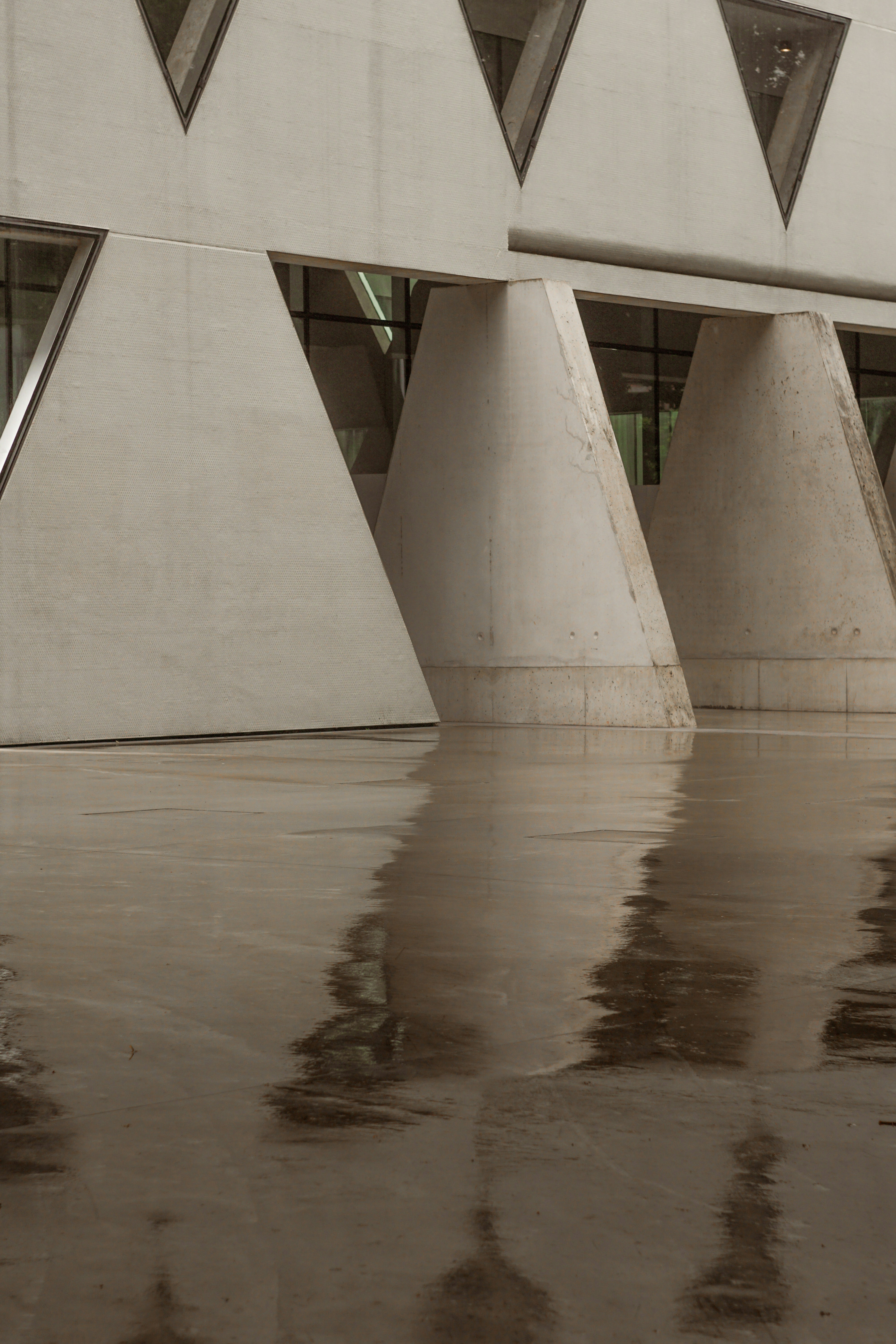 Rain-Washed Geometry: Concrete Triangles and Reflections