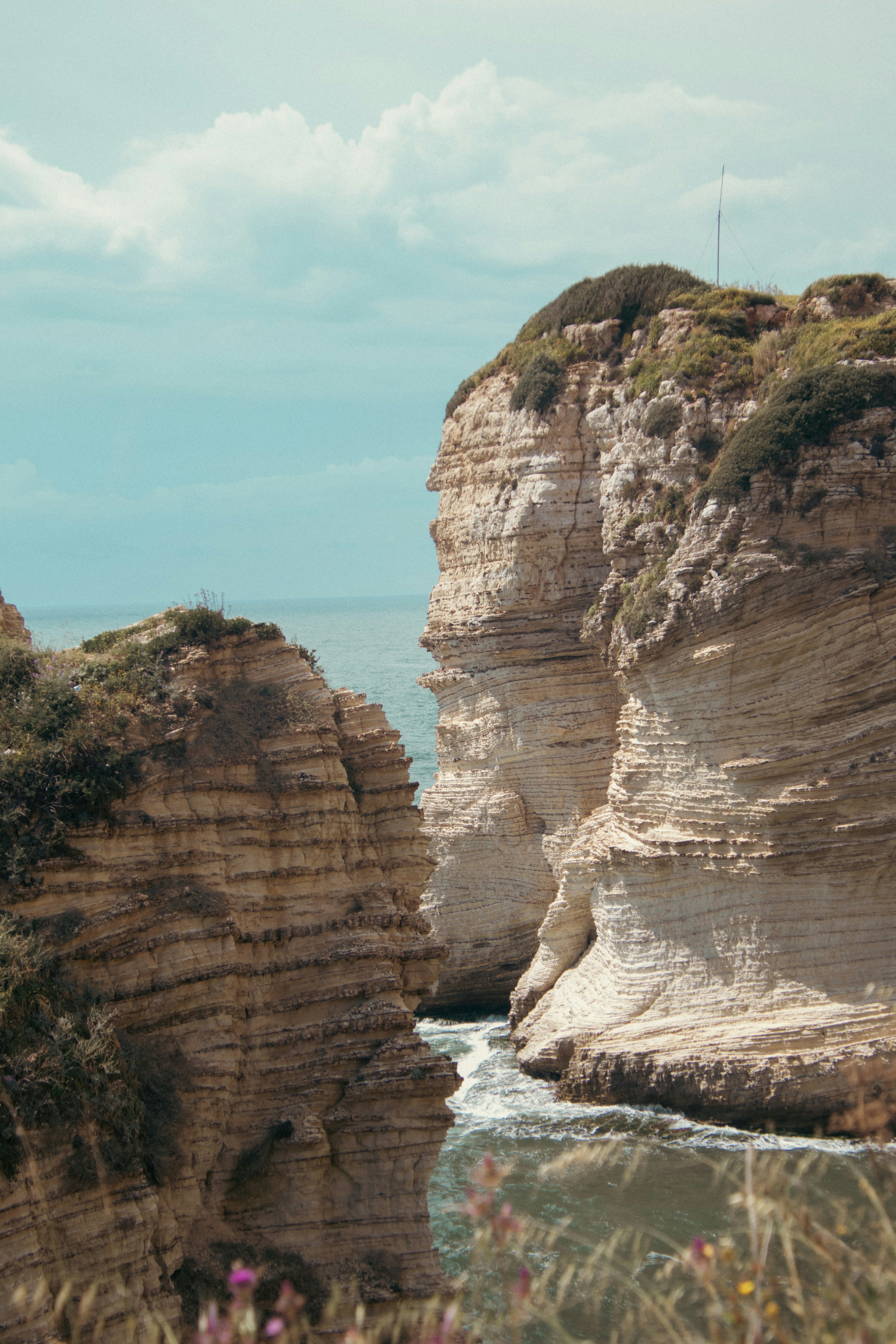 A view of the ocean from a cliff photo – Free Lebanon Image on Unsplash