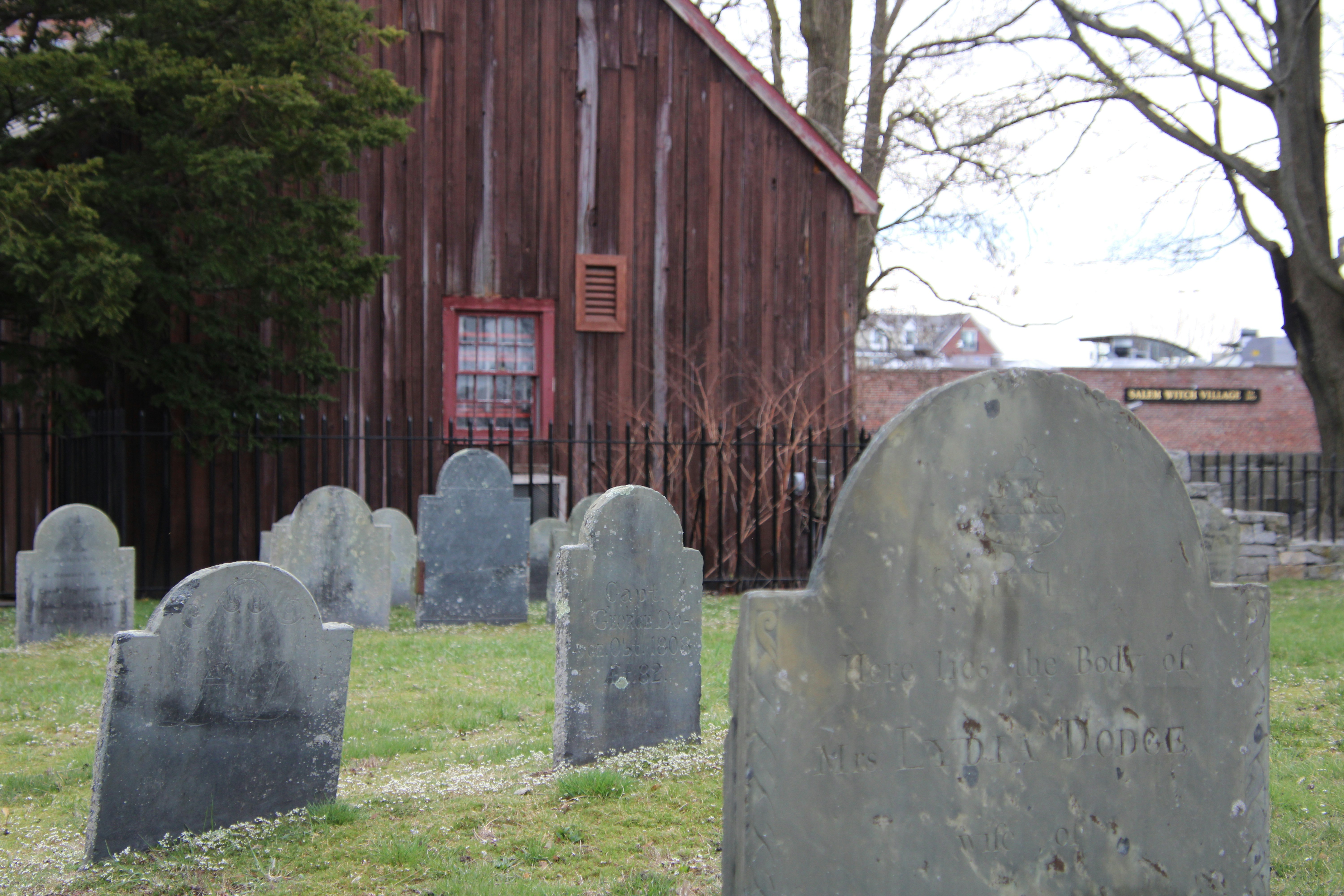 A cemetery with a red barn in the background photo – Free United states ...
