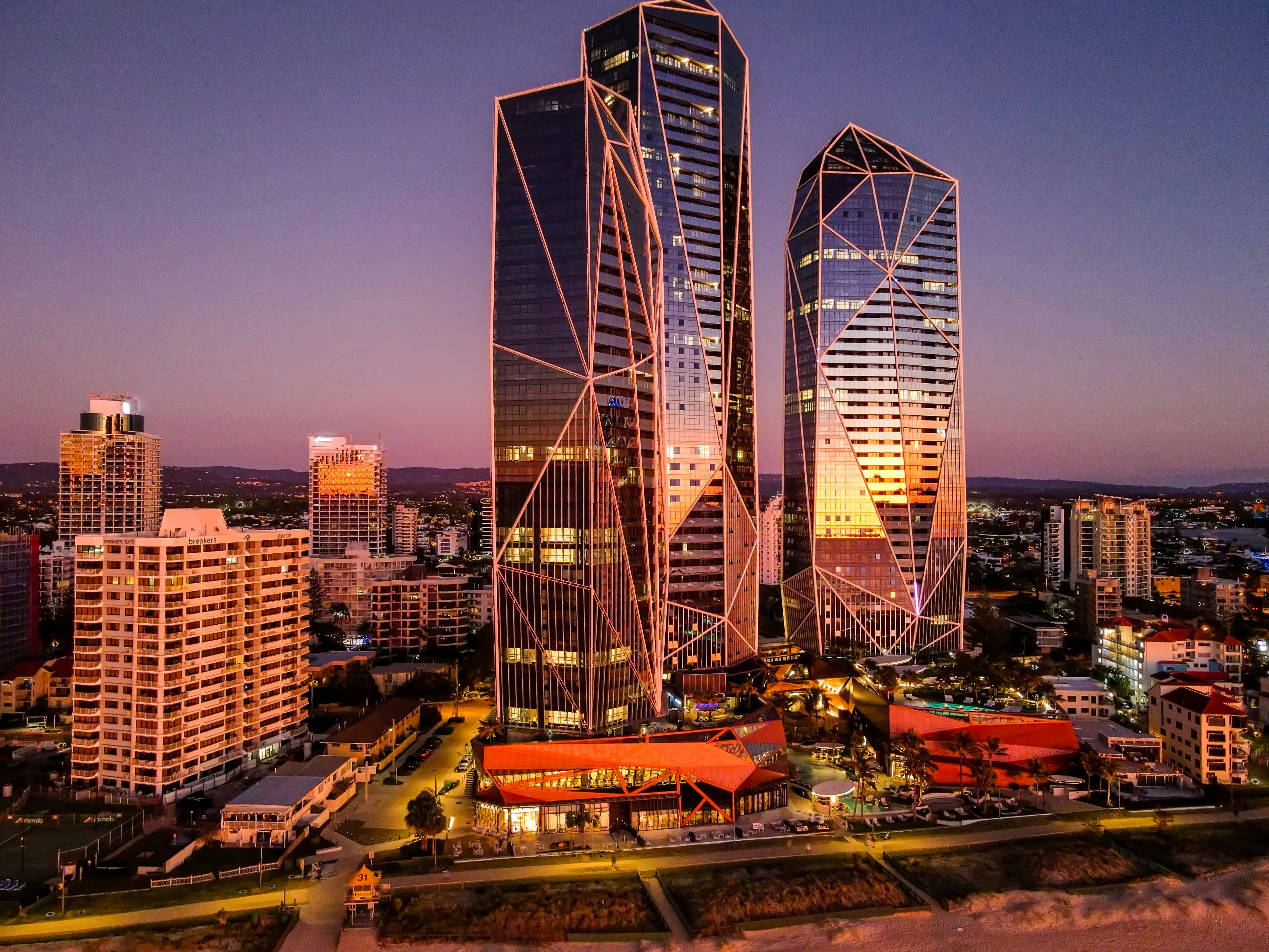 Twin-Tower Facade Echo: Sunset Facets of a Downtown Skyline
