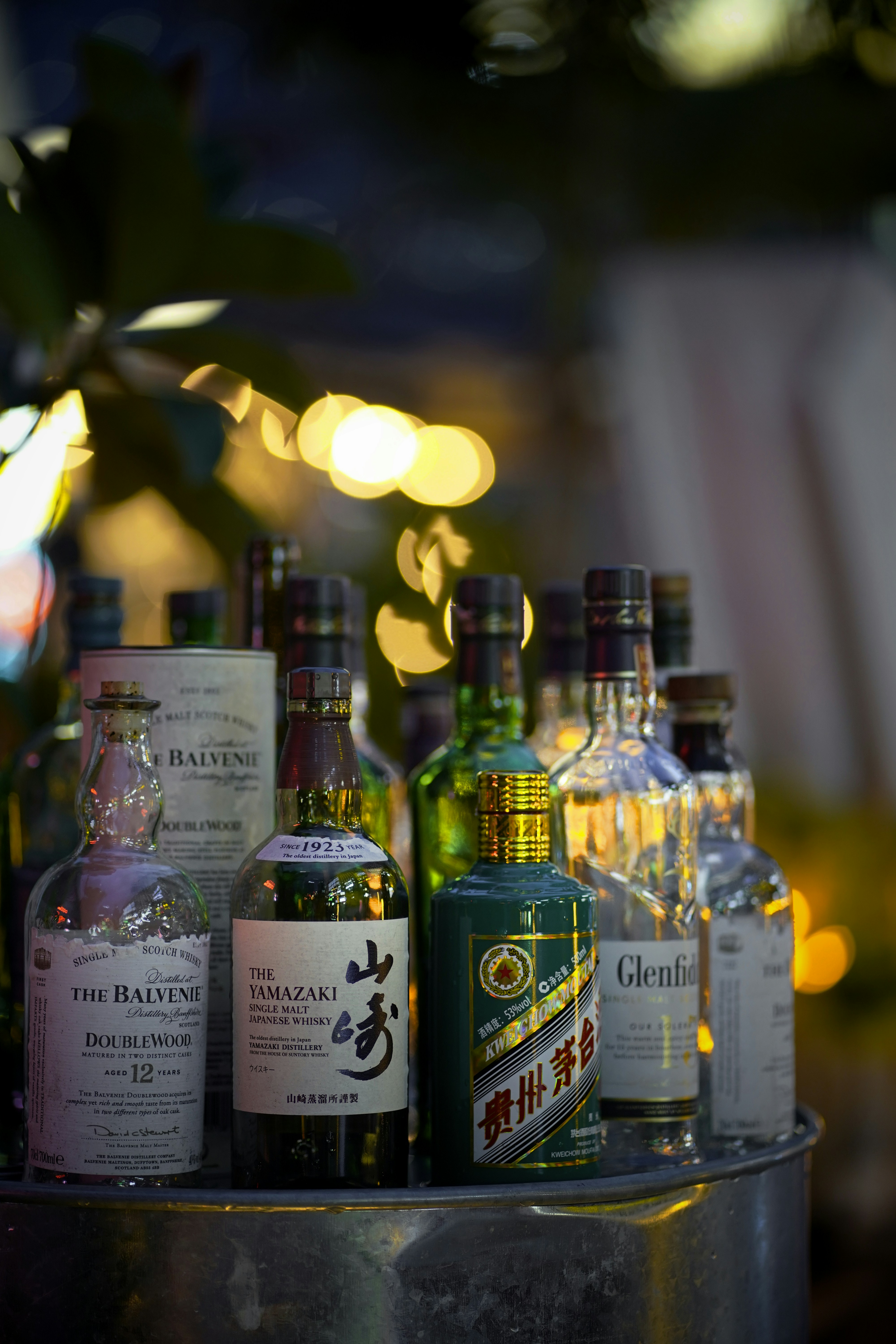 A bunch of bottles that are sitting on a table photo – Free Coastal ...