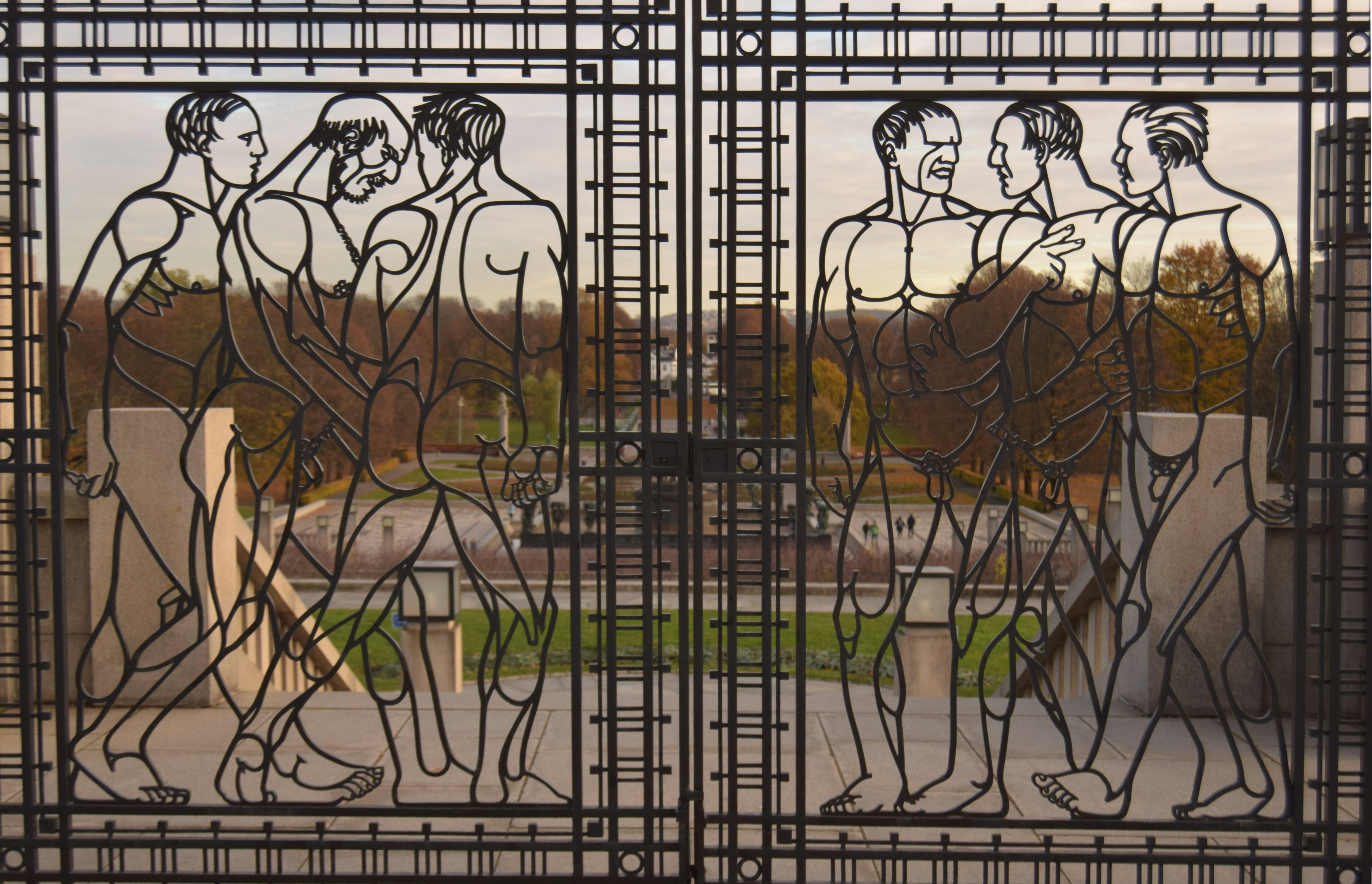 Interwoven Figures in Metal Garden Gates