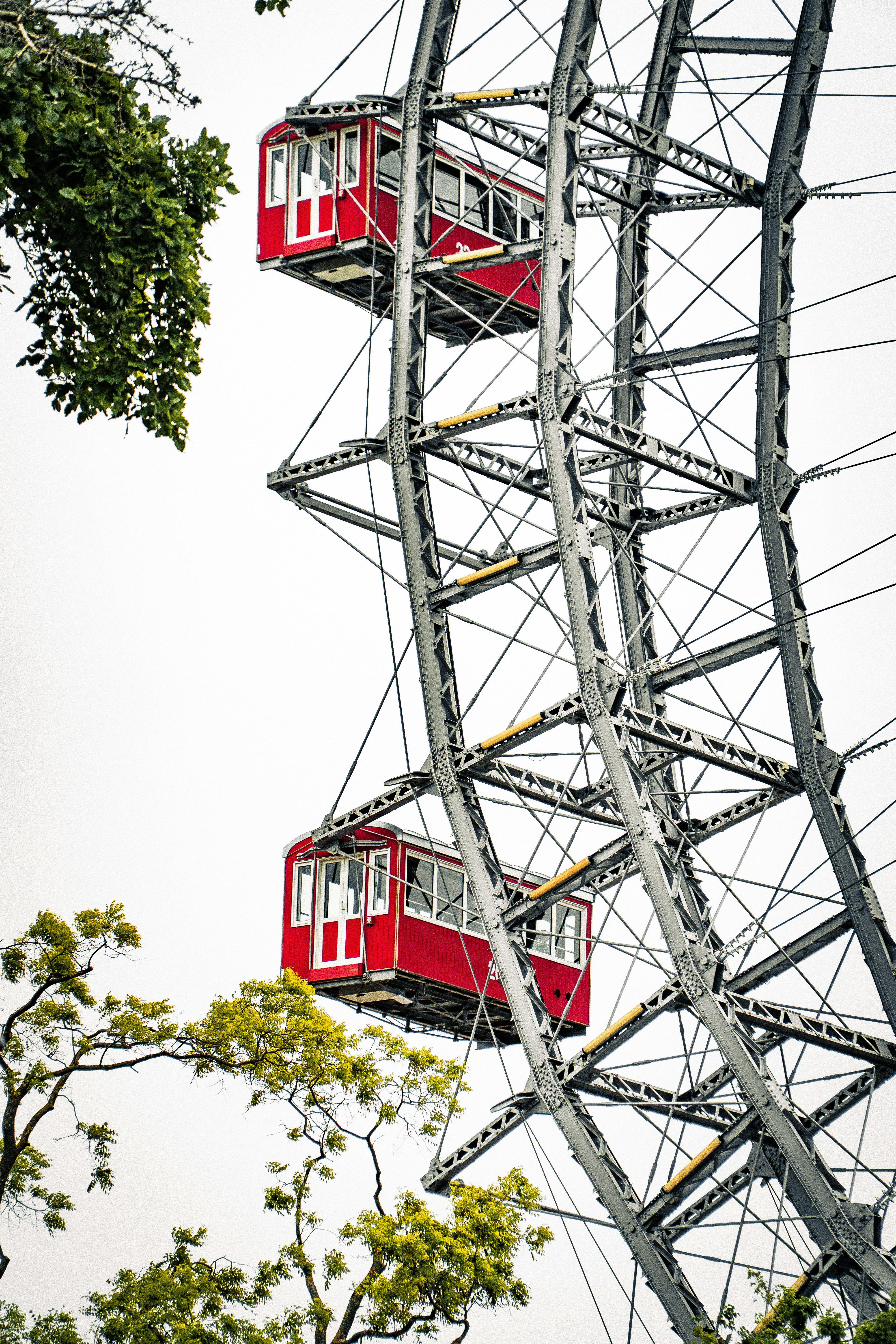 A ferris wheel with two people on it photo – Free Fun Image on Unsplash