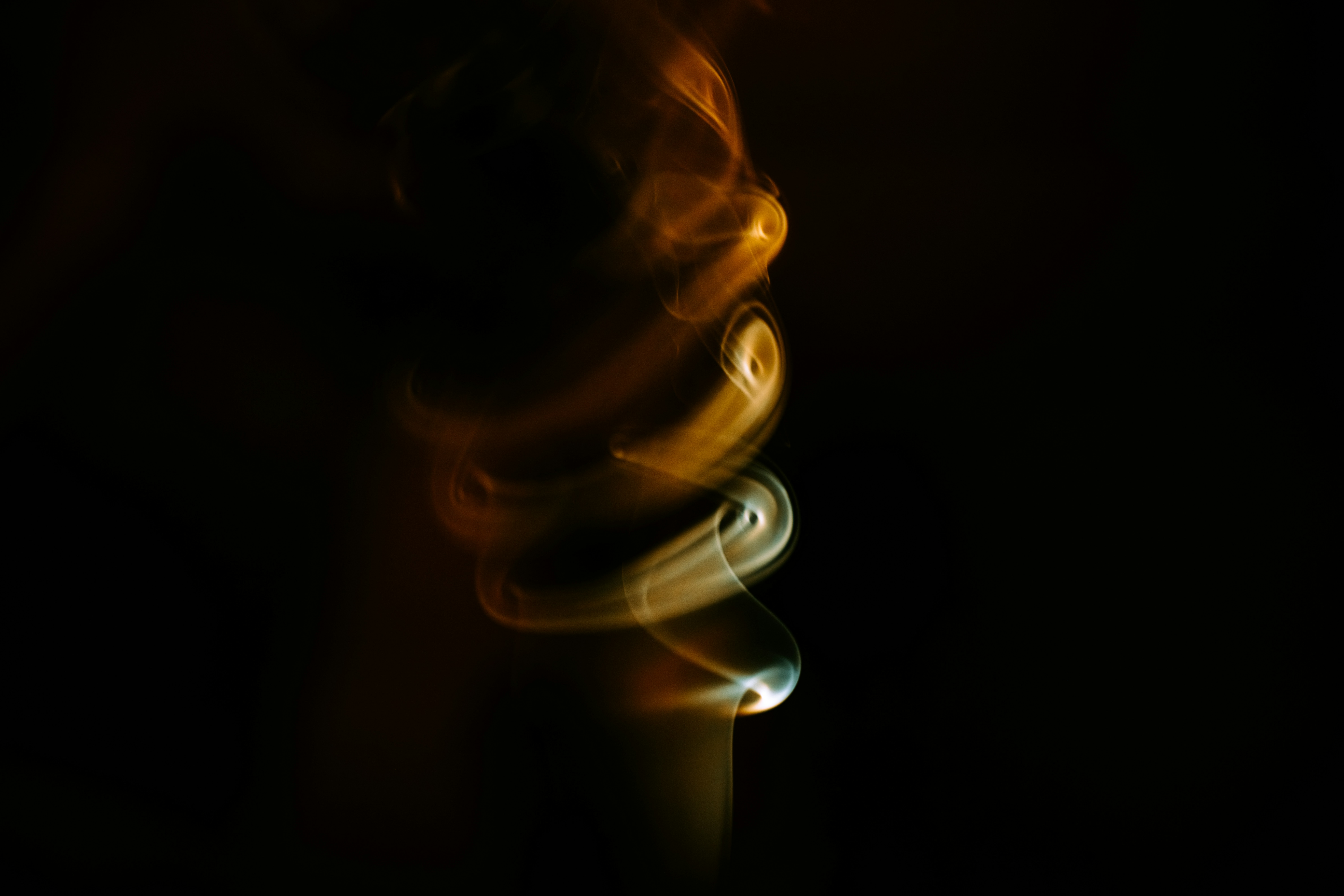 Whispers of Light: The Dance of Smoke
