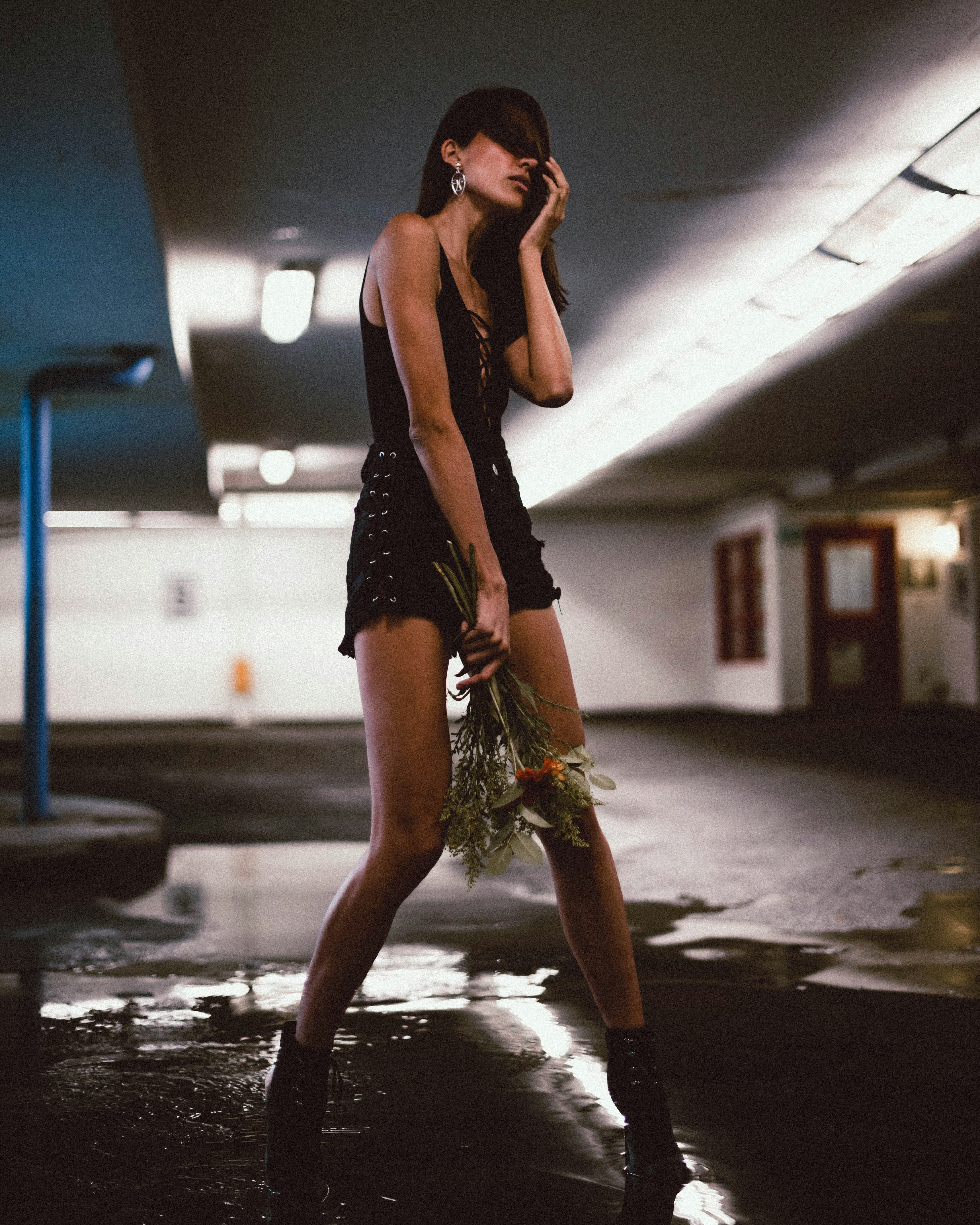 Neon Veil: A Parking-Garage Night Portrait