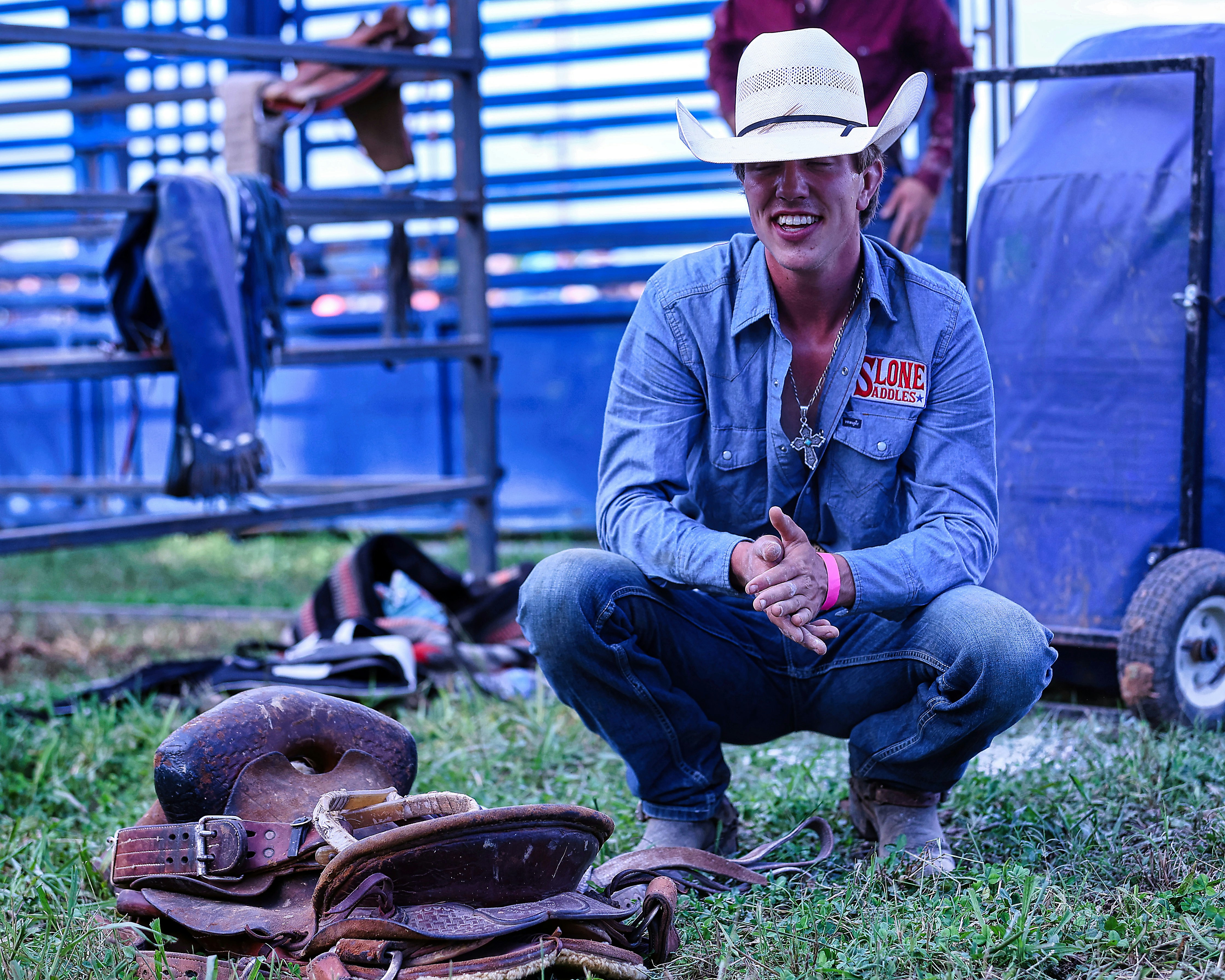 Field-side Cowboy: Leather, Laughter, and Blue Bleachers