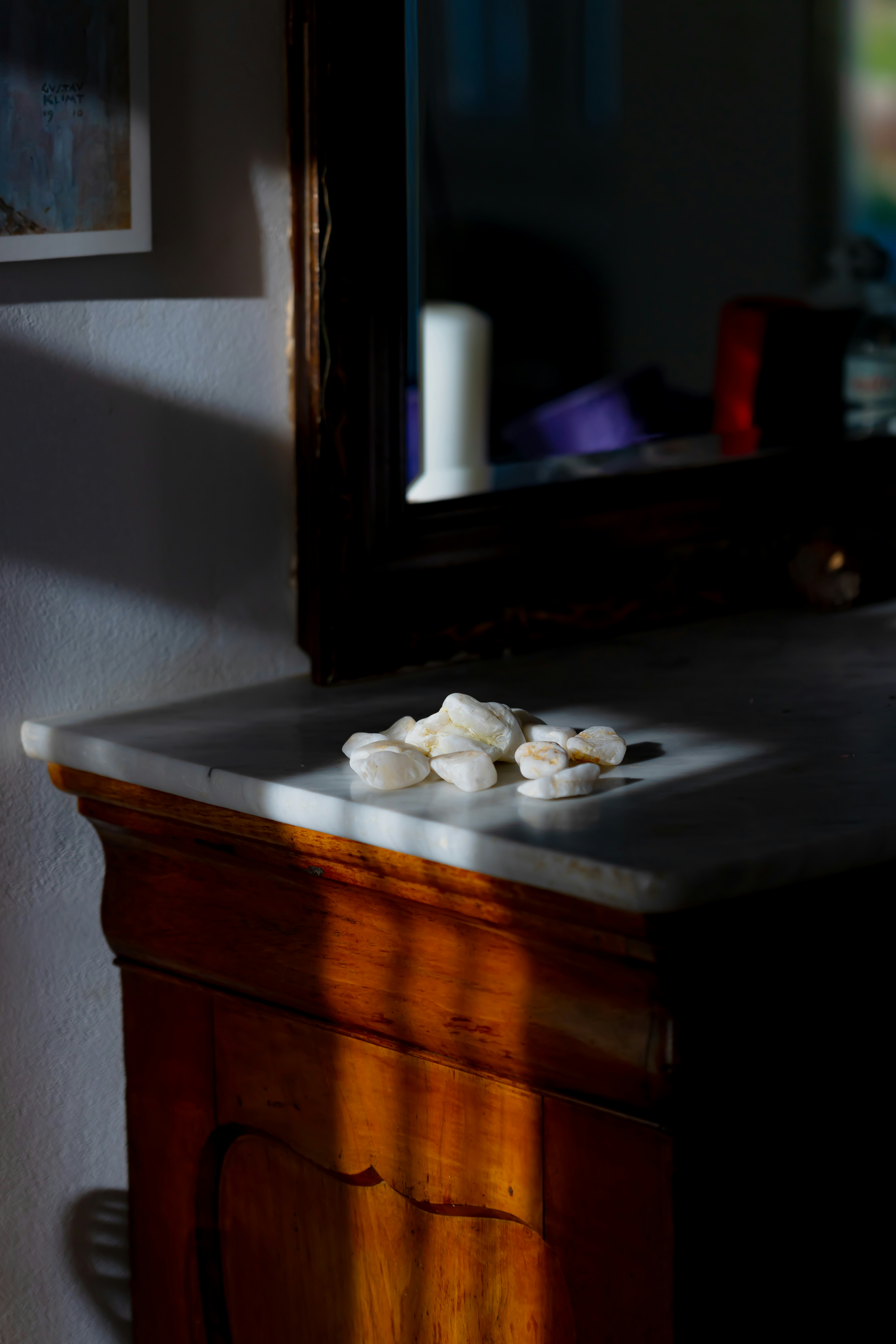 Pebbles on Marble: Quiet Light in a Vintage Vanity