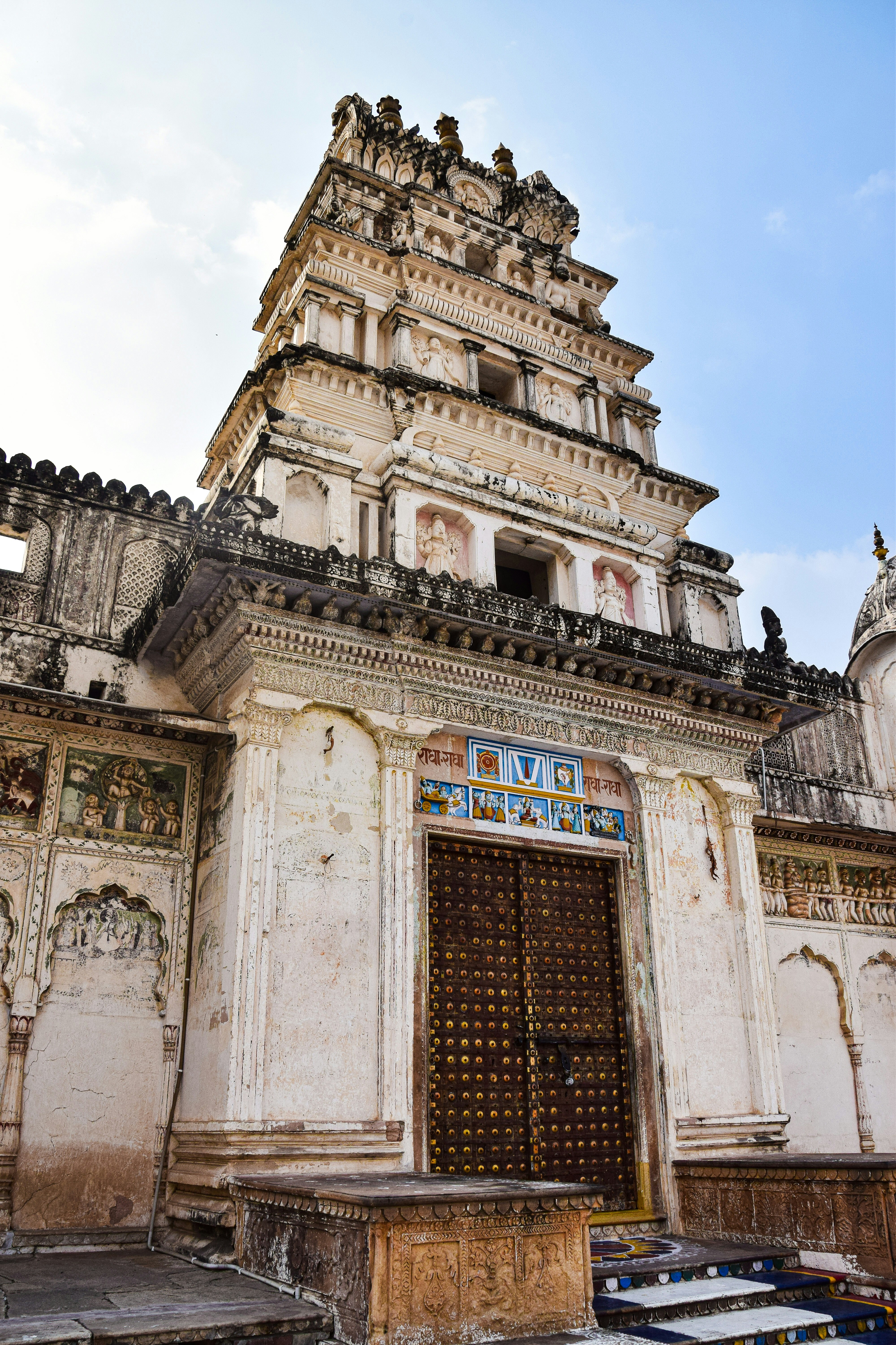 A tall building with a clock tower on top of it photo – Free Ajmer ...