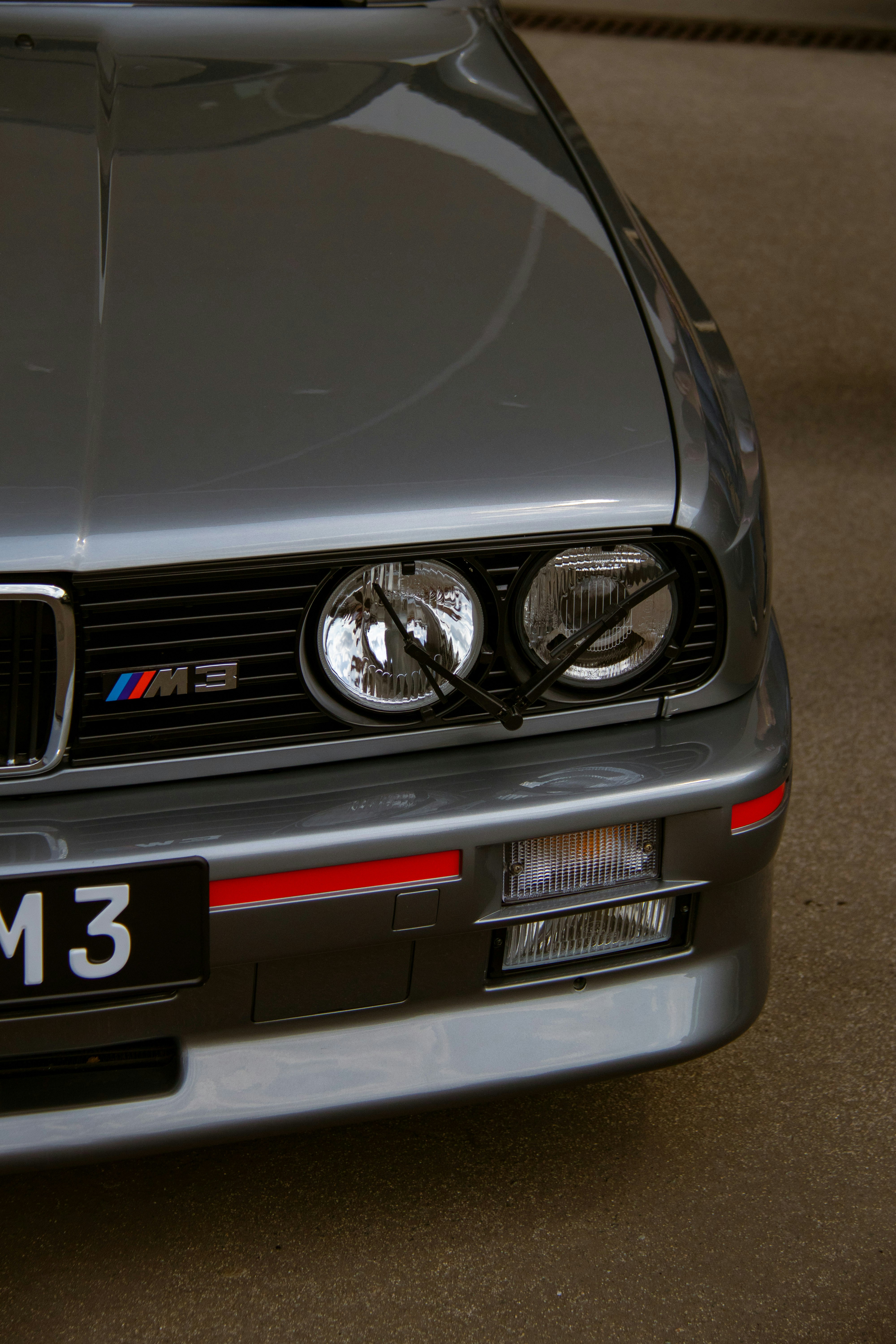 Un gros plan de l’avant d’une voiture photo – Photo Bmw e30 m3 Gratuite ...