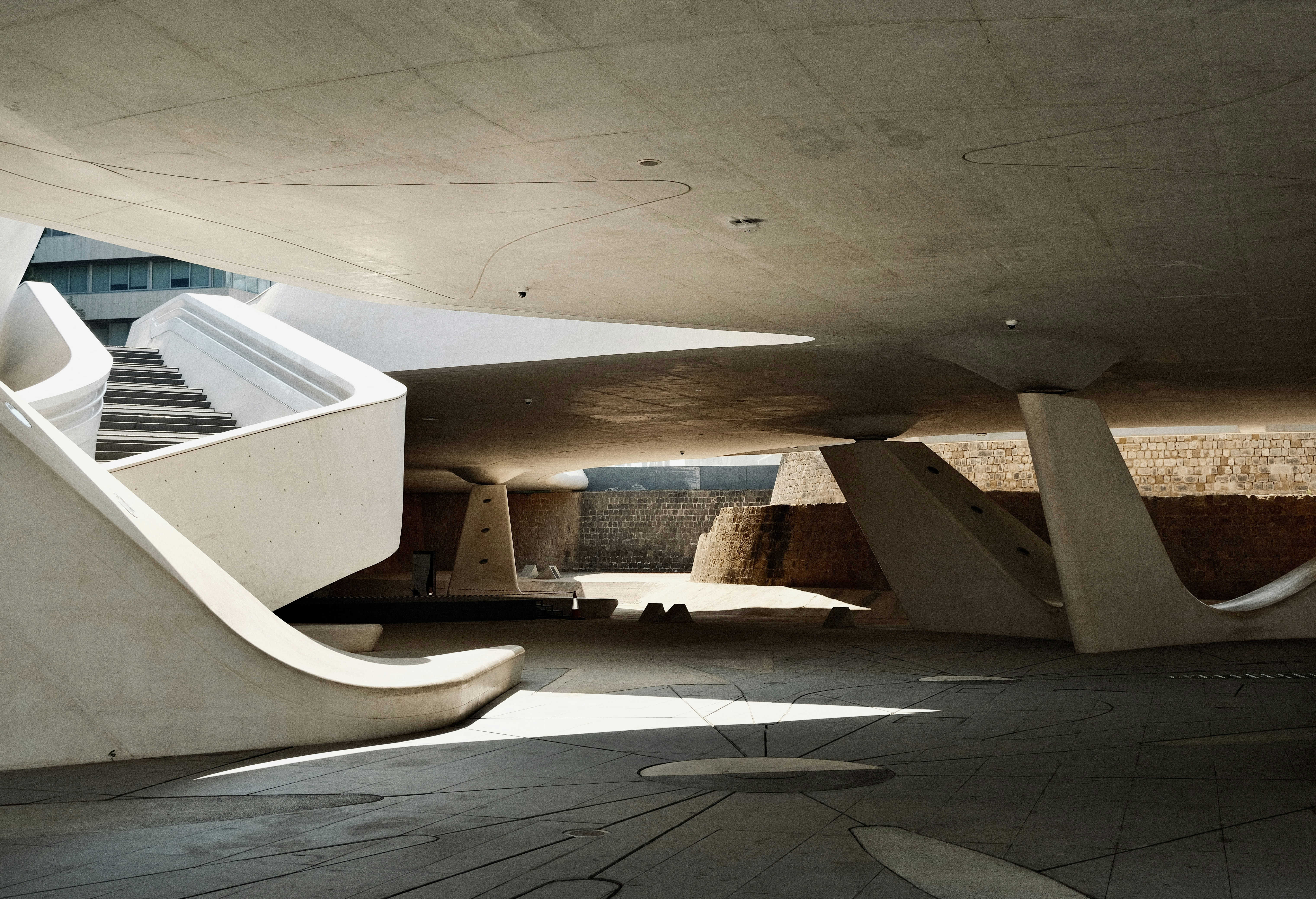 A very large building with some stairs in it photo – Free City Image on ...