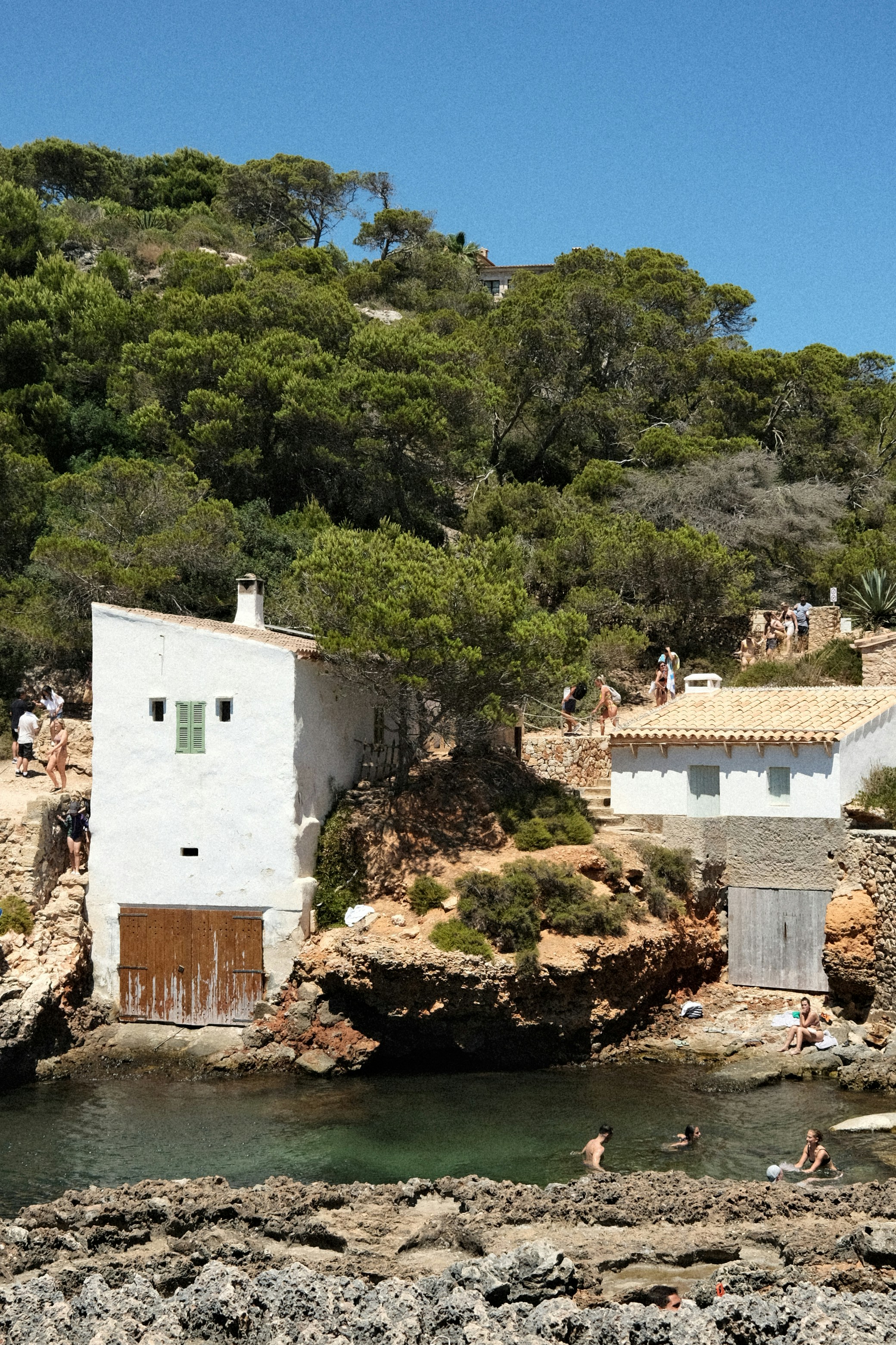 White-walled Quarters Nestled Against the Cliffside