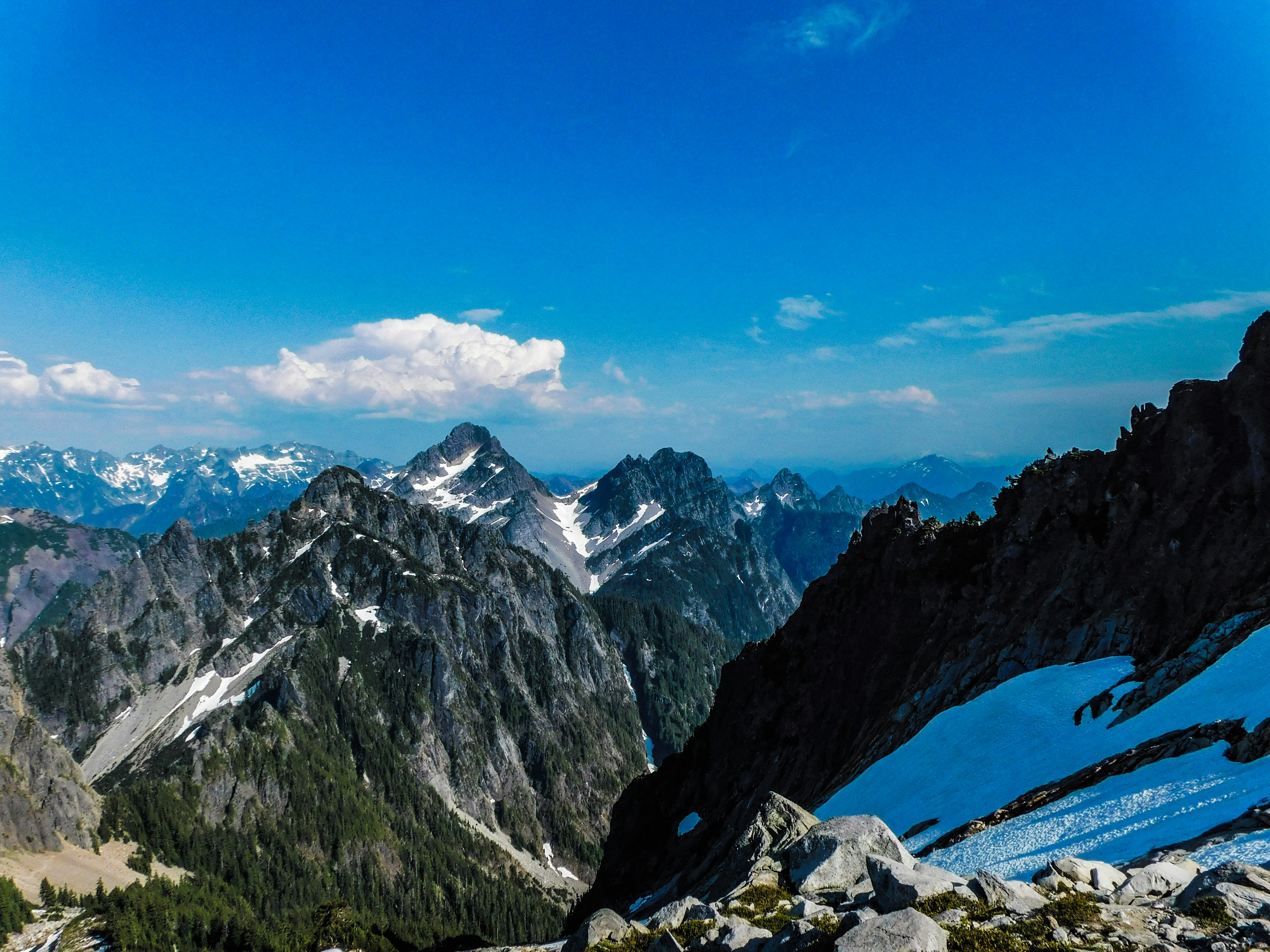 A view of a mountain range from a high point of view photo – Free ...