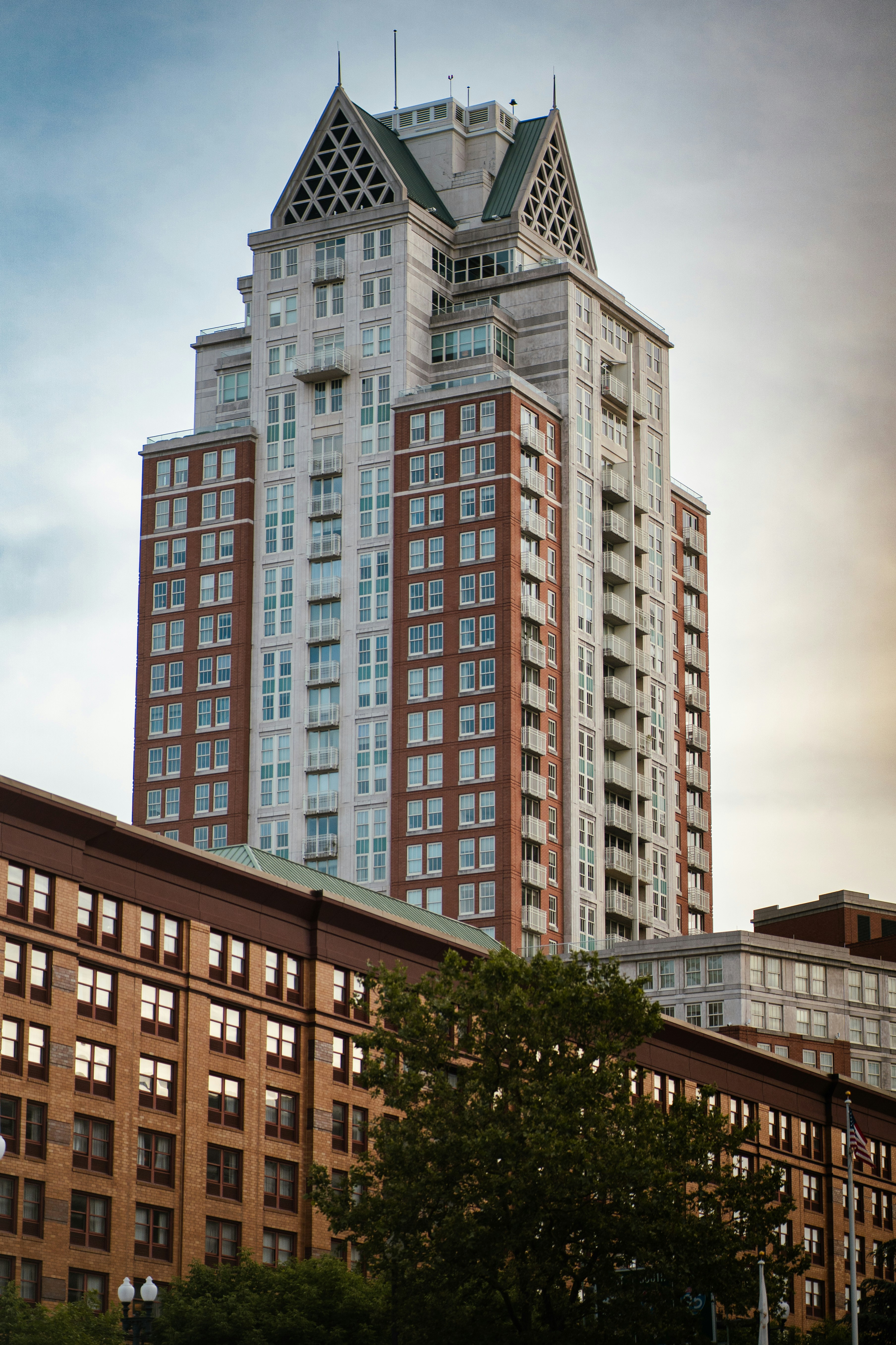 A tall building with a clock on the top of it photo – Free Providence ...