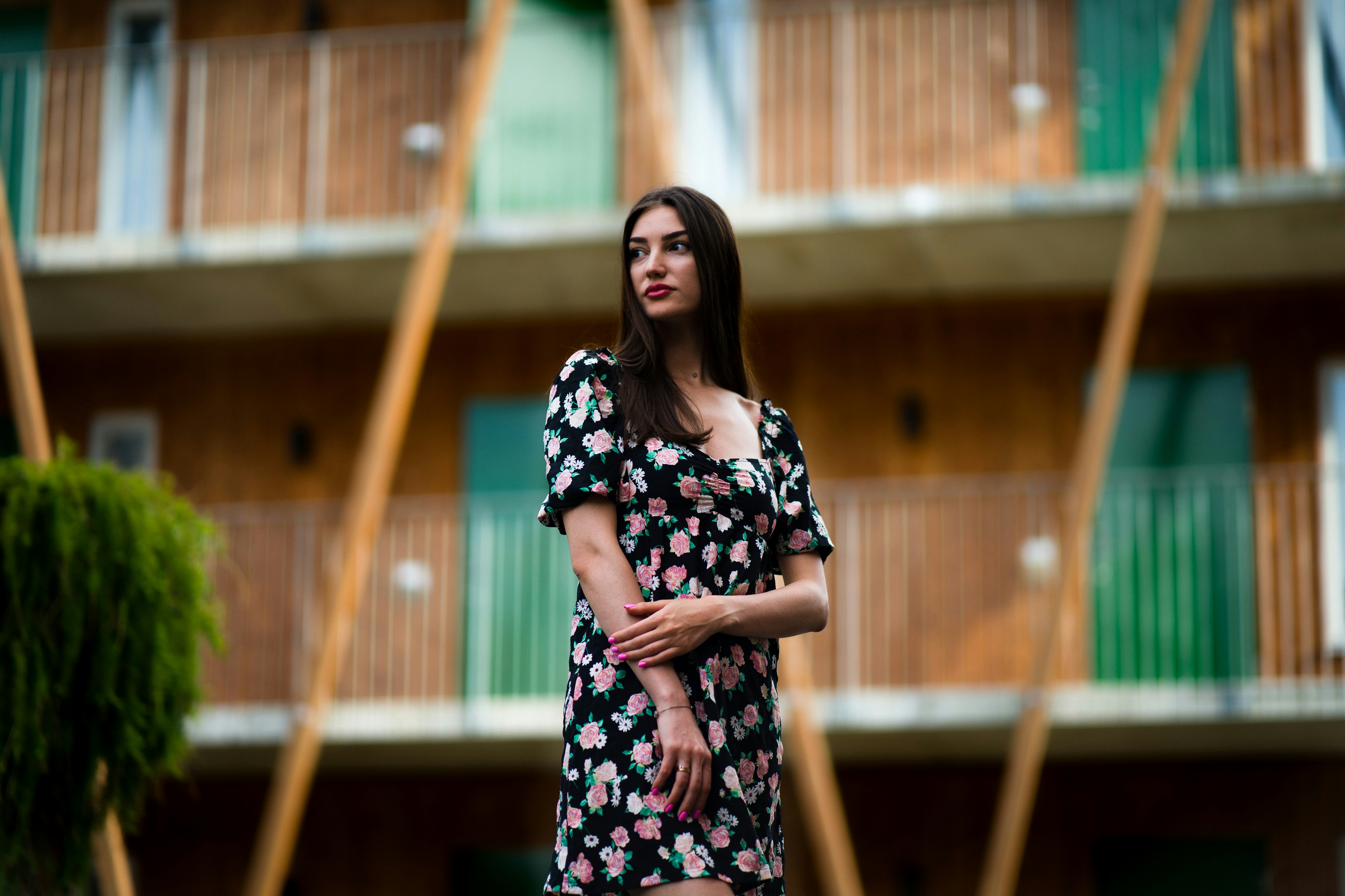 Floral Dress Portrait Under Green Balconies