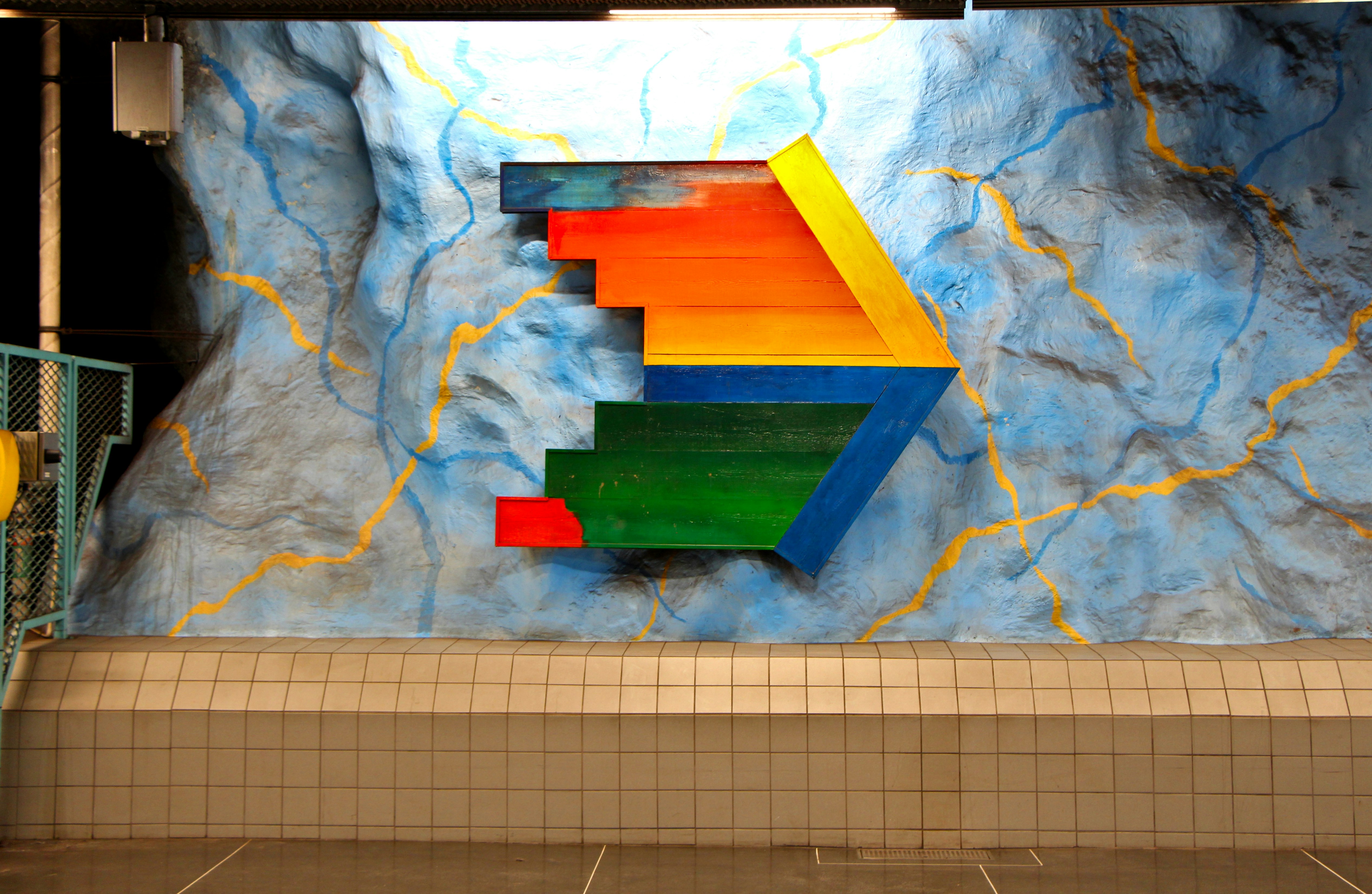 Geometric Prism On a Murmured Blue Wall