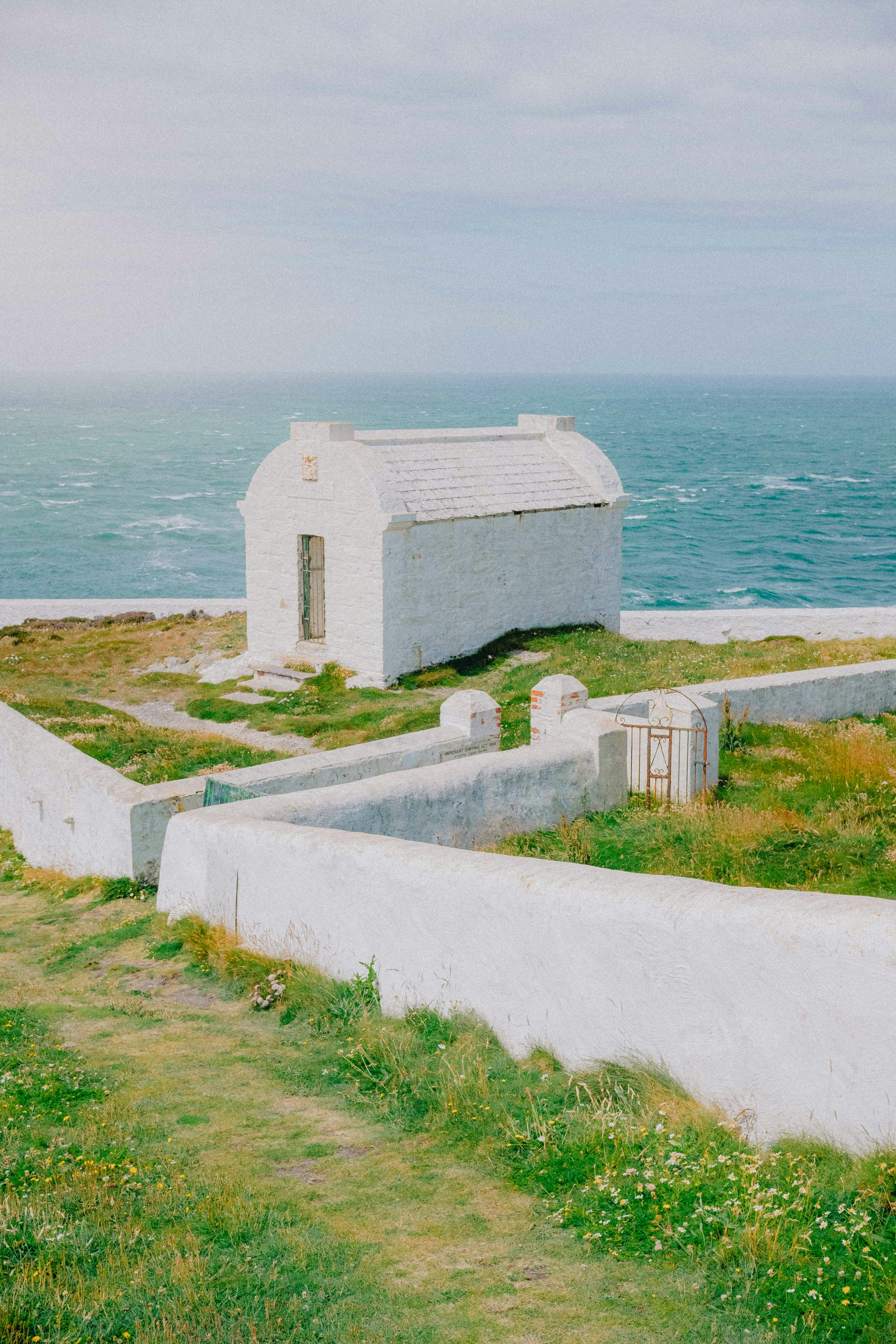 Cliffside Chapel: A White Beacon Above the Wind-Swept Sea