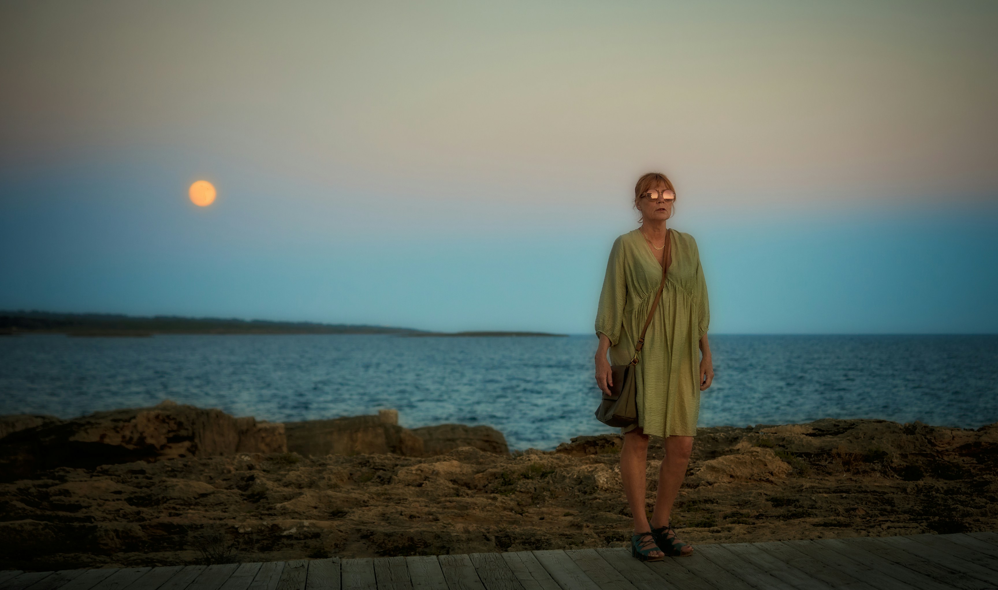 Dusk on the Dune: A Solemn Figure by the Sea