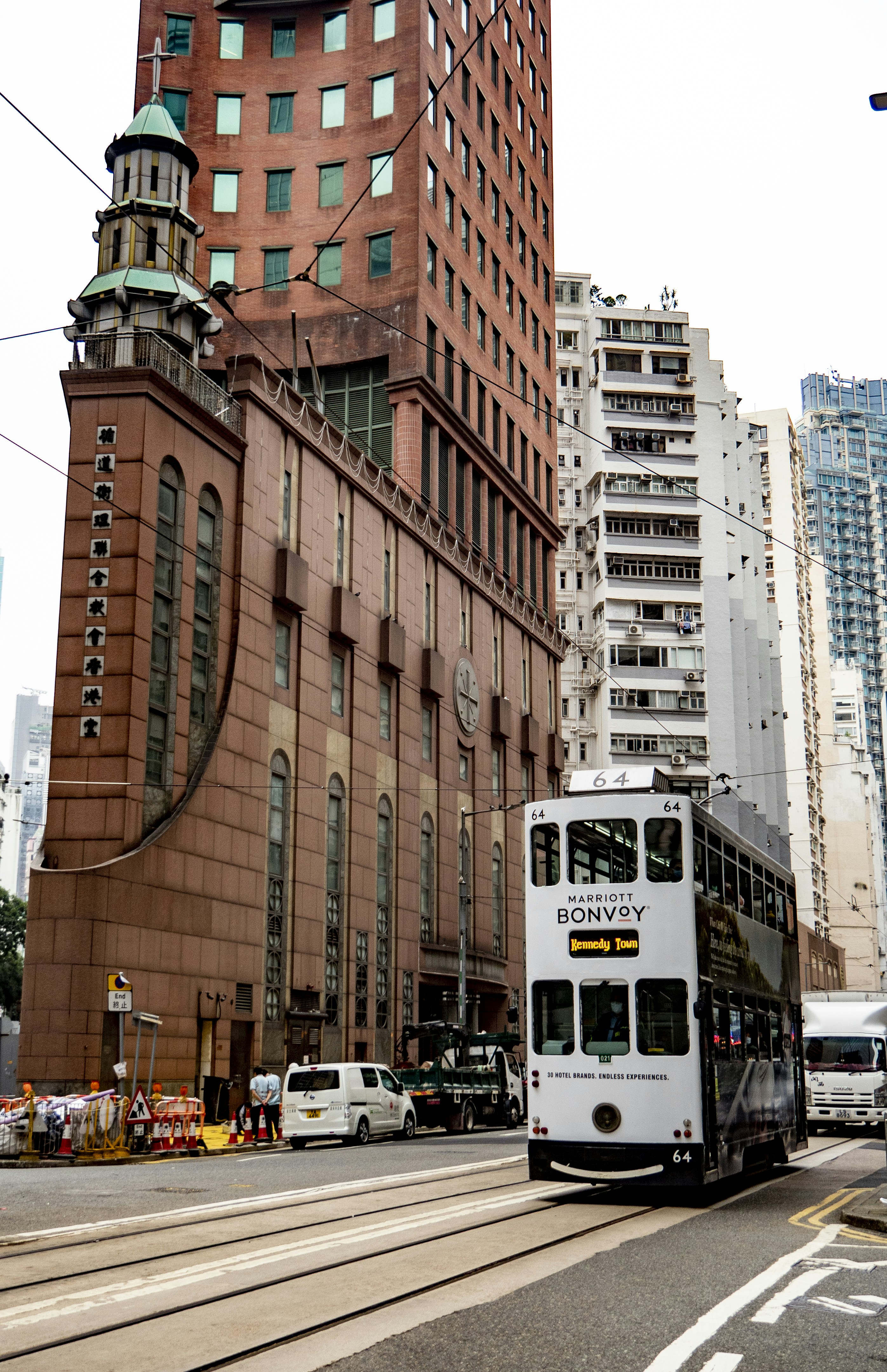 Streetcar Calm Amidst Red Brick and Skyscrapers