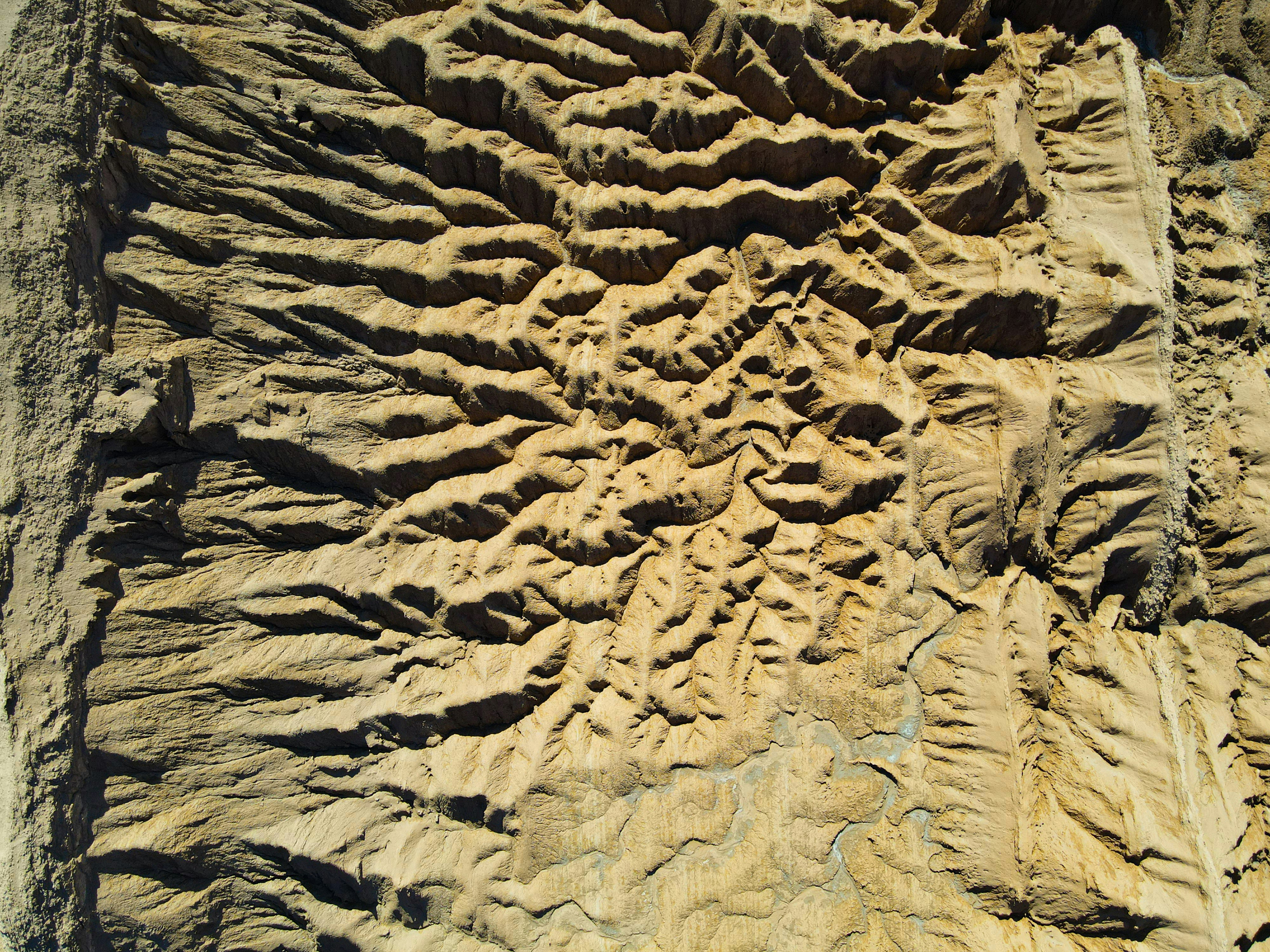A close up of a rock formation with a sky background photo – Free Road ...