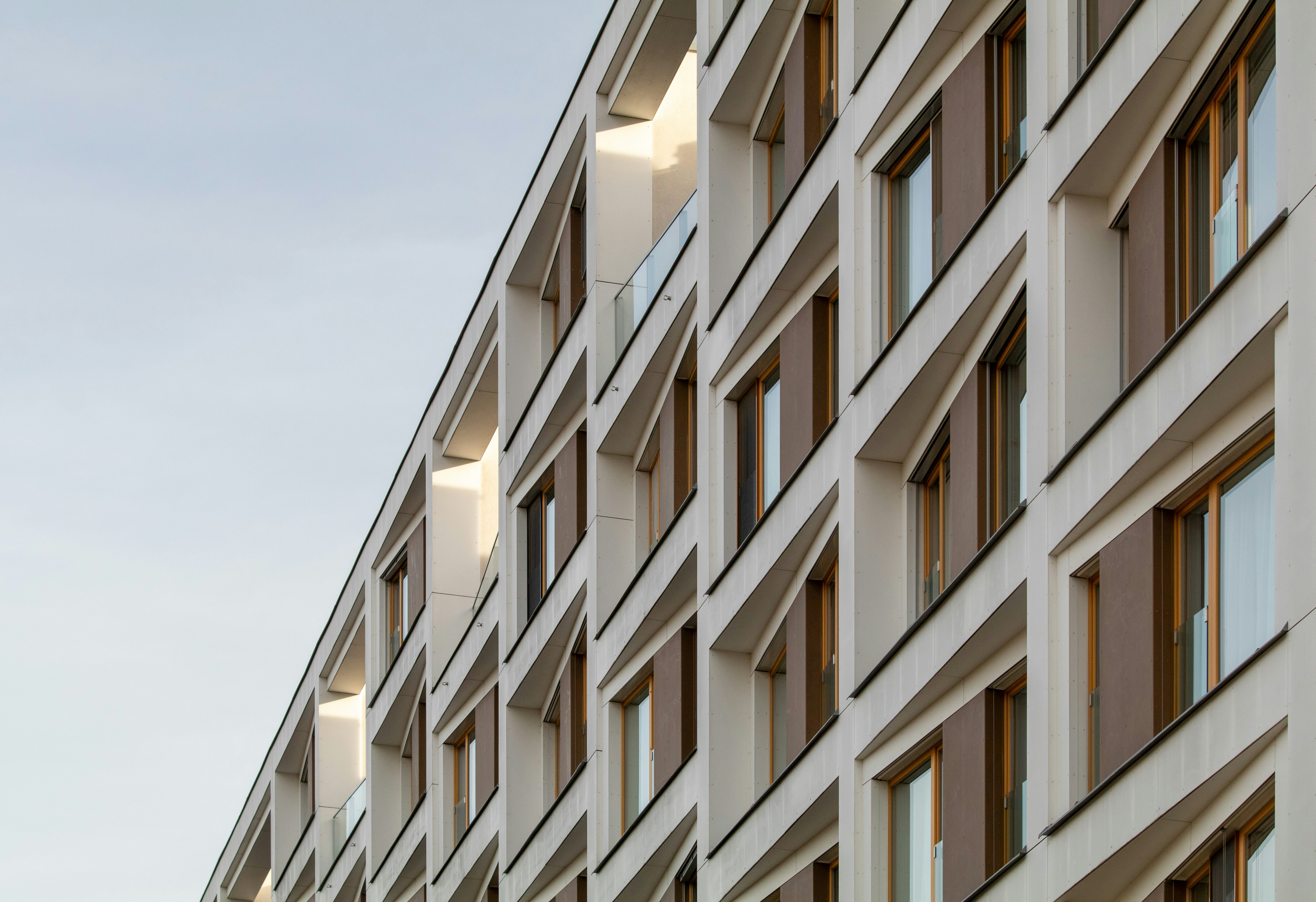 A tall white building with lots of windows photo – Free Czech republic ...