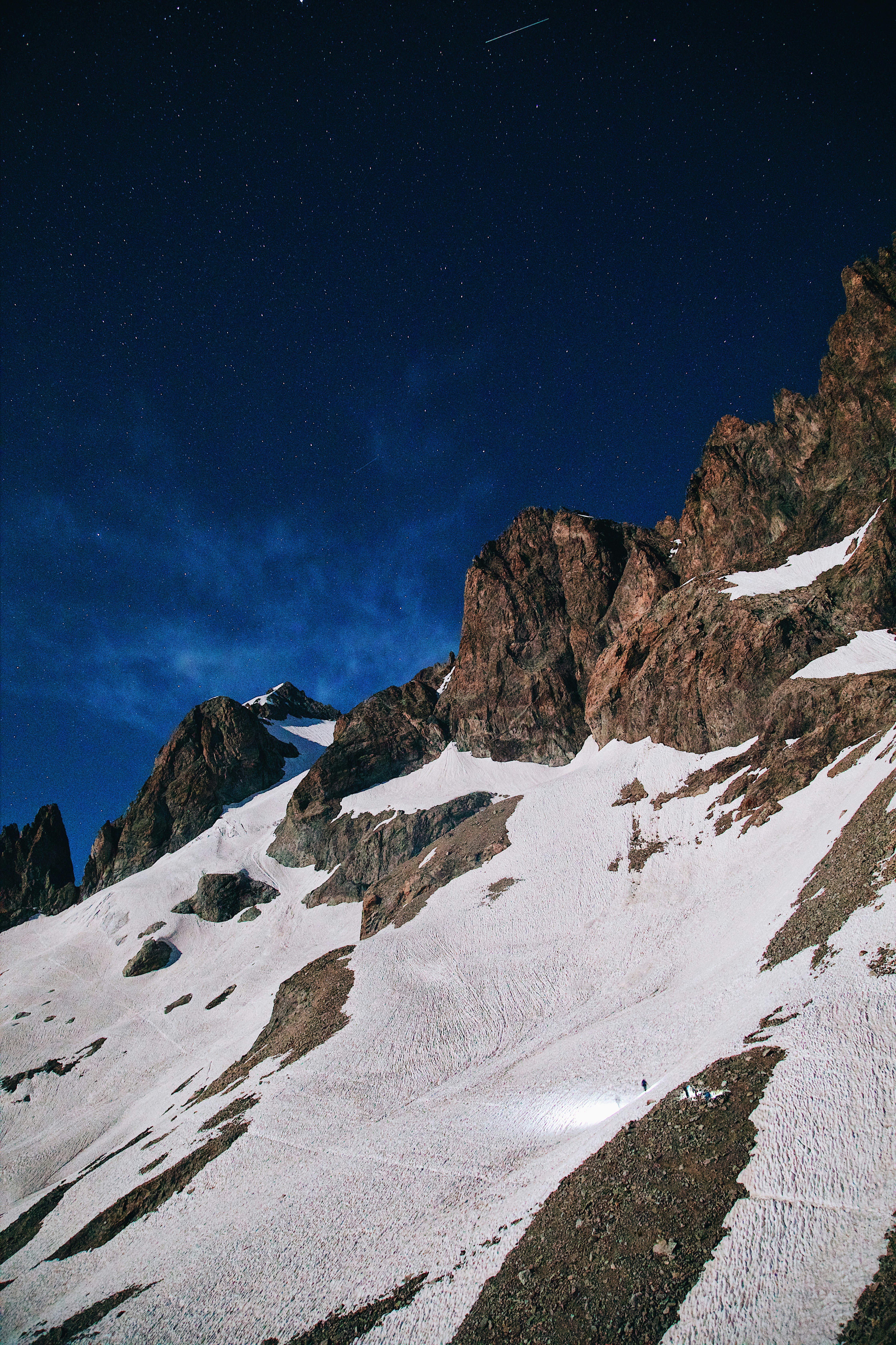 Meteor over Snowbound Peaks: A Night Above the Alpine Ridge