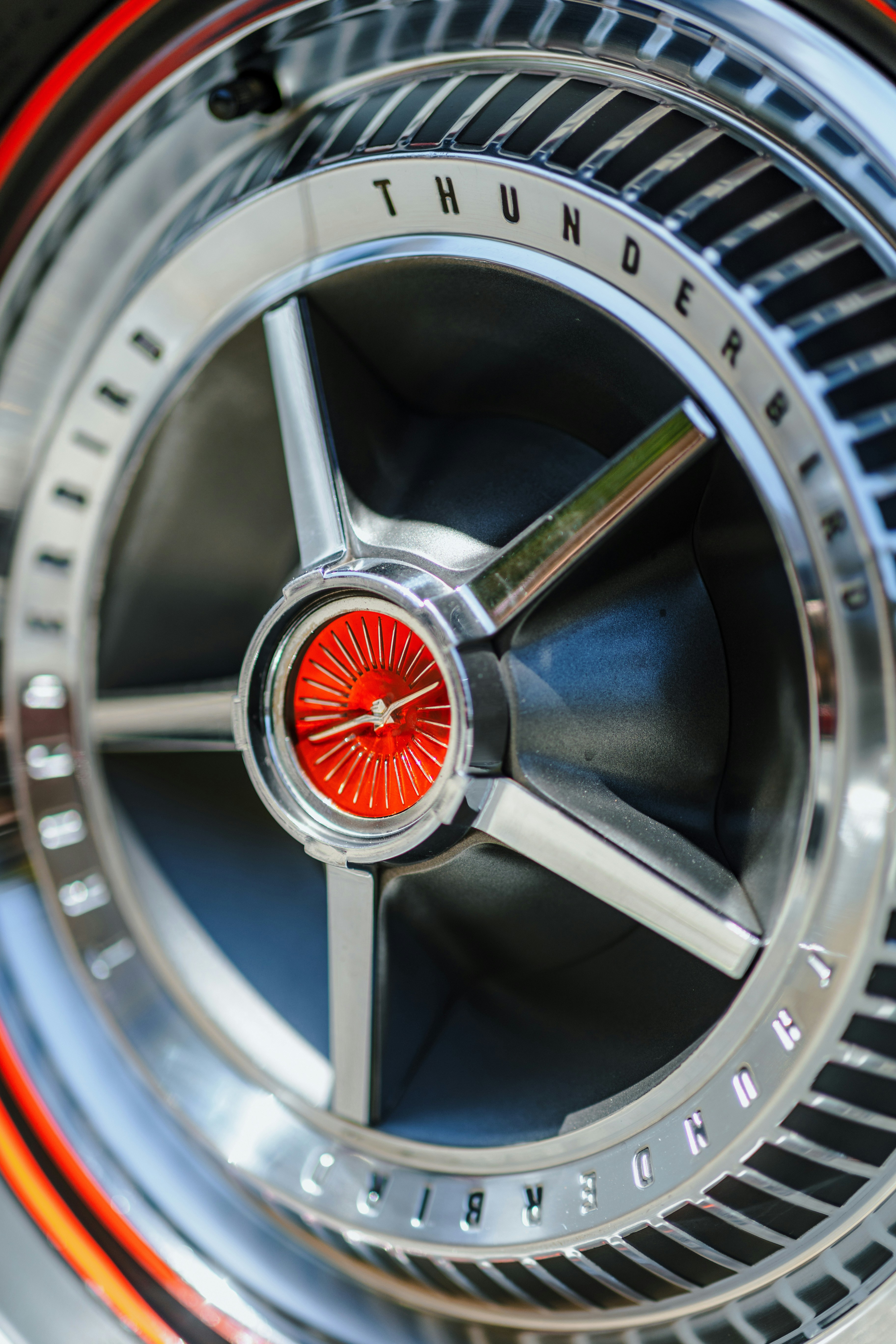 Red Center: A Close-Up of Thunderbolt Finishing and Chrome Spokes
