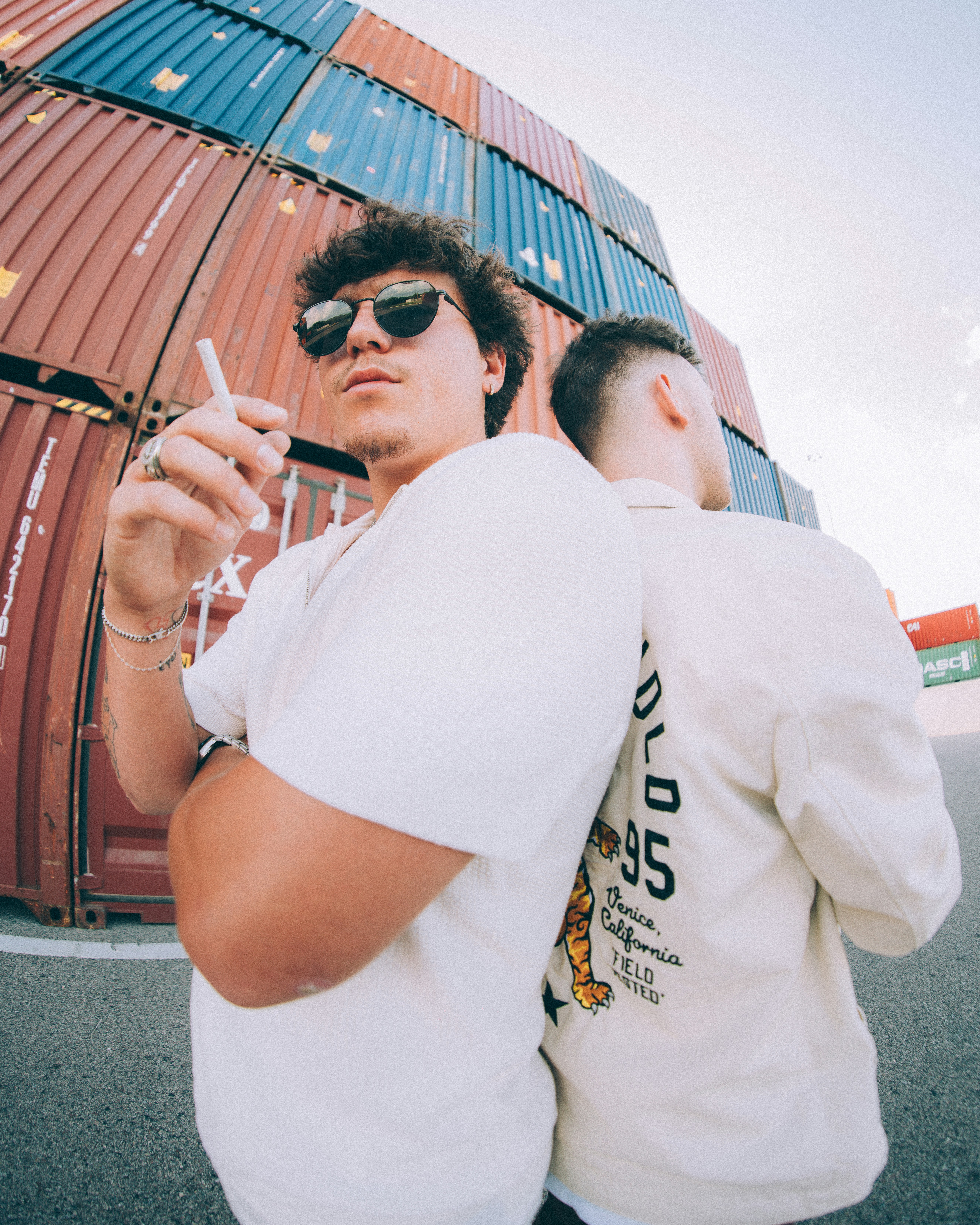 Two young men standing next to each other photo – Free Portrait Image ...