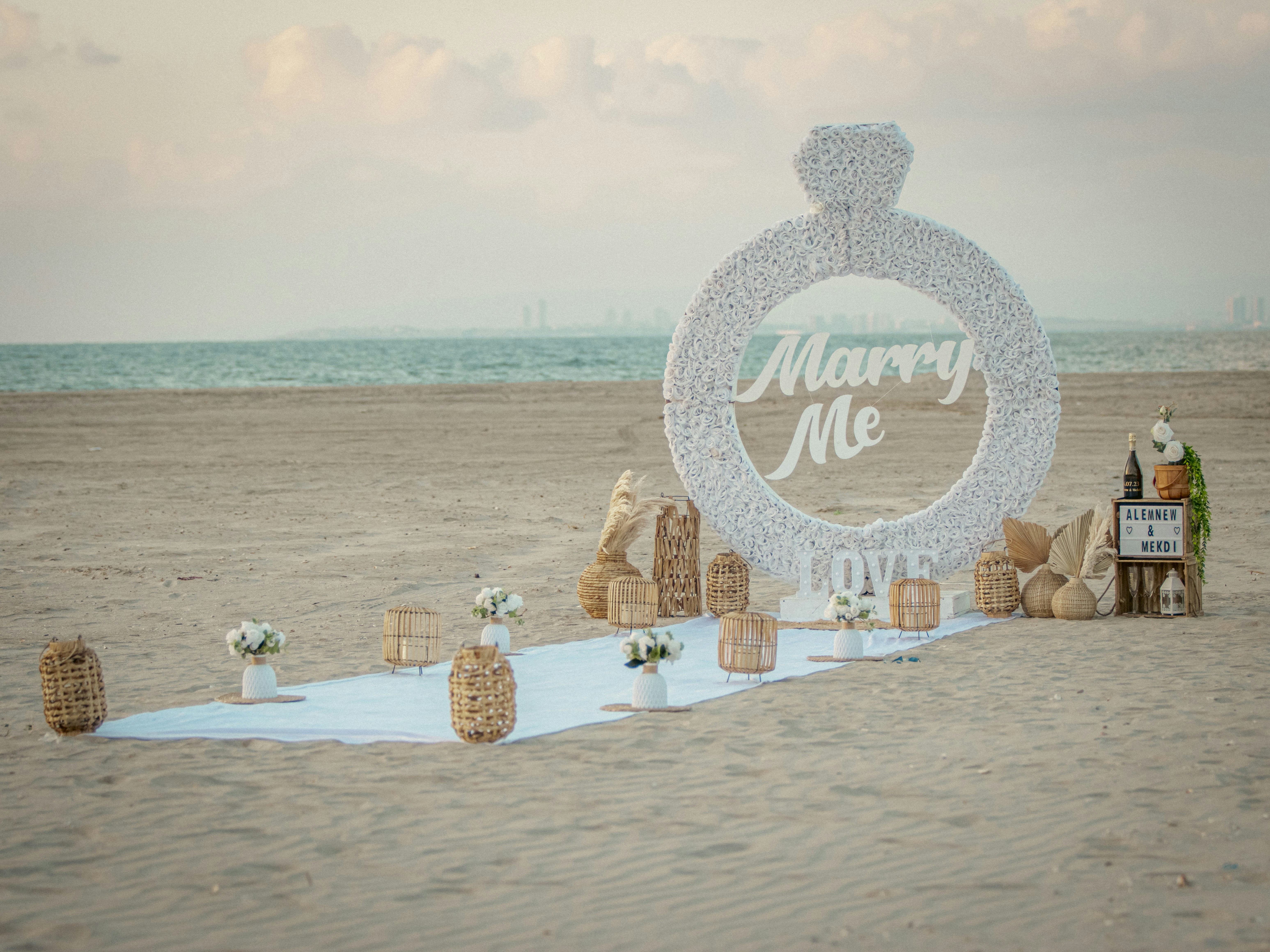 A sign that says marry me on the beach photo – Free Beach Image on Unsplash