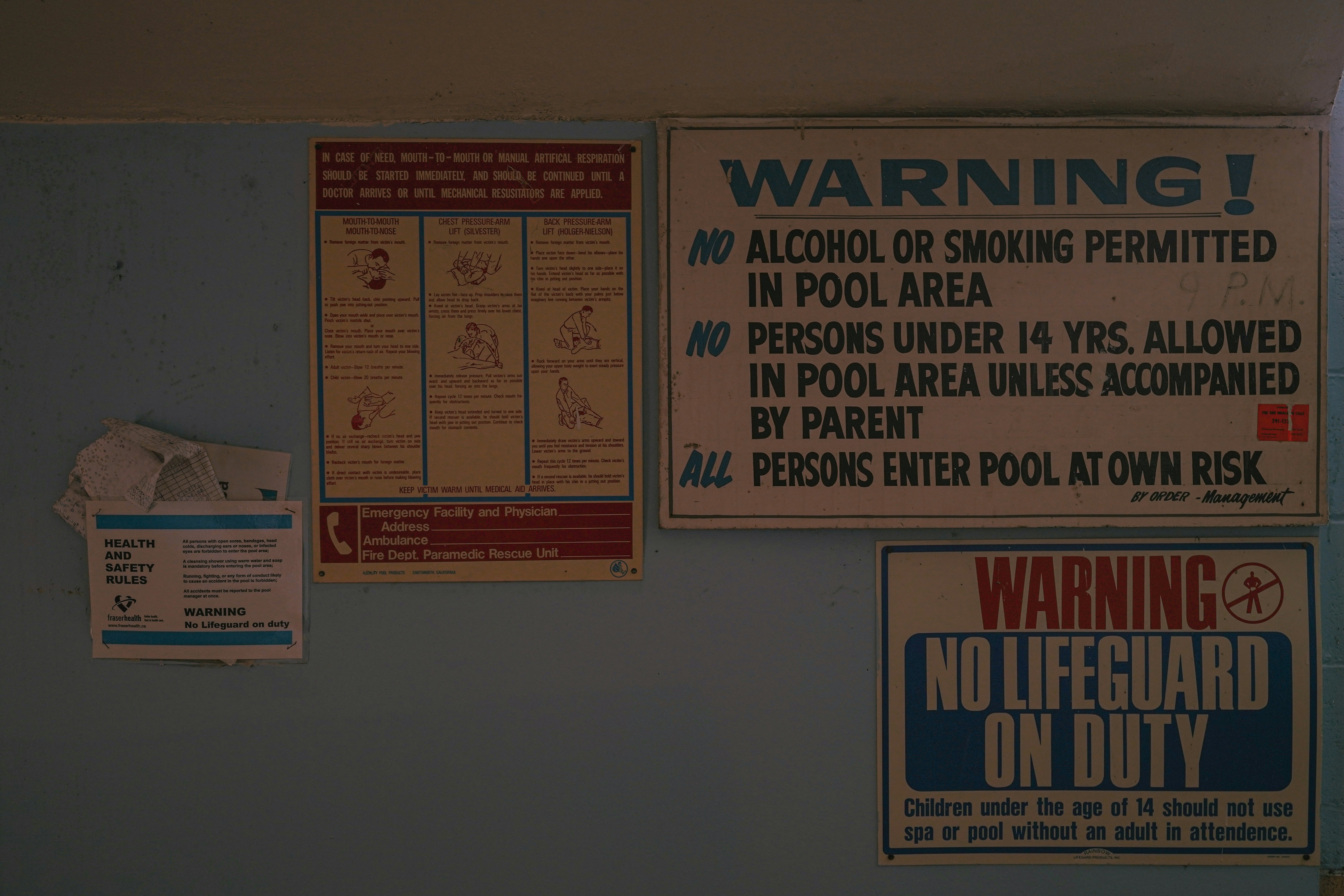 A group of warning signs on a wall photo – Free Liminal space Image on ...