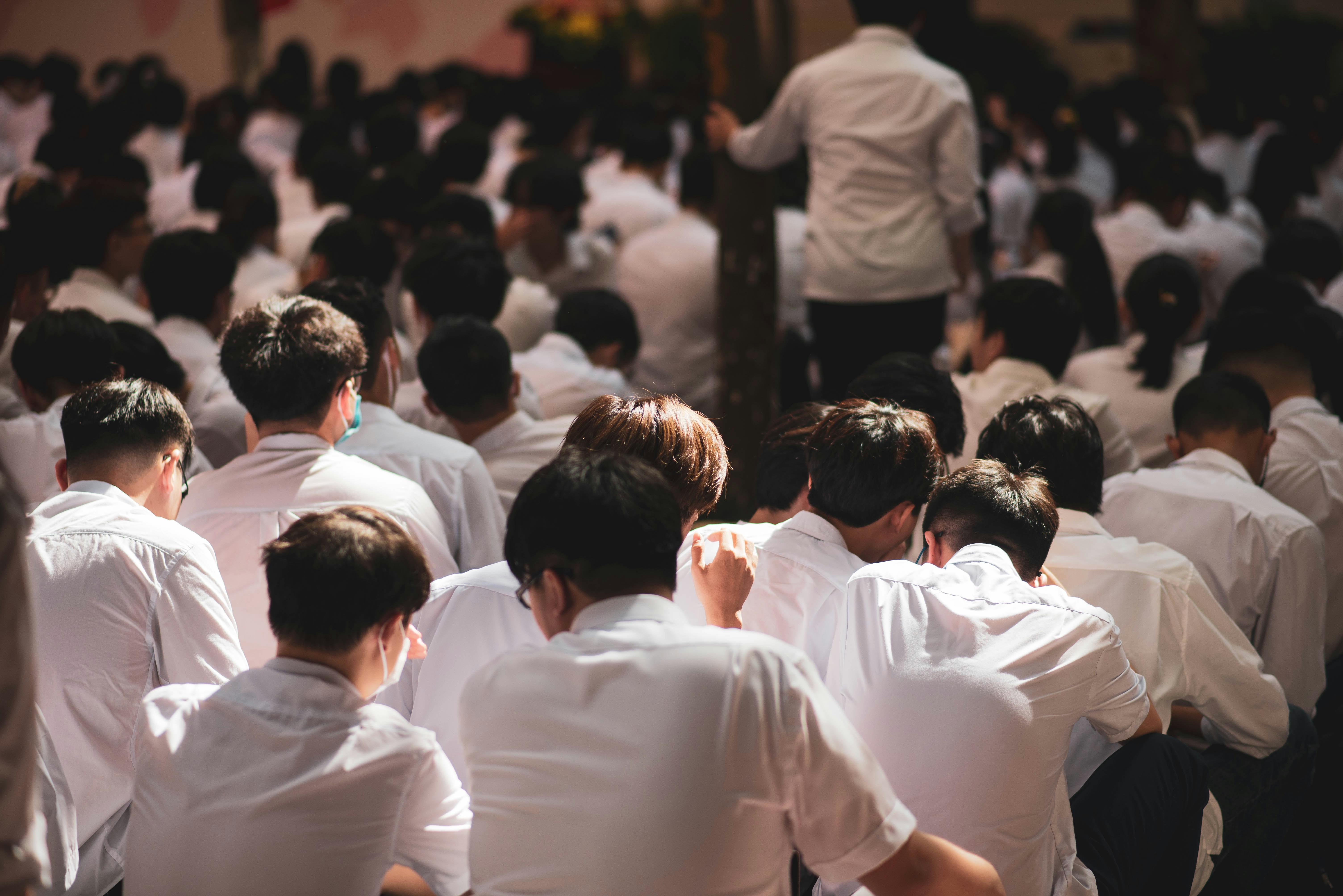 A group of people standing in a crowd photo – Free Sunlight Image on ...